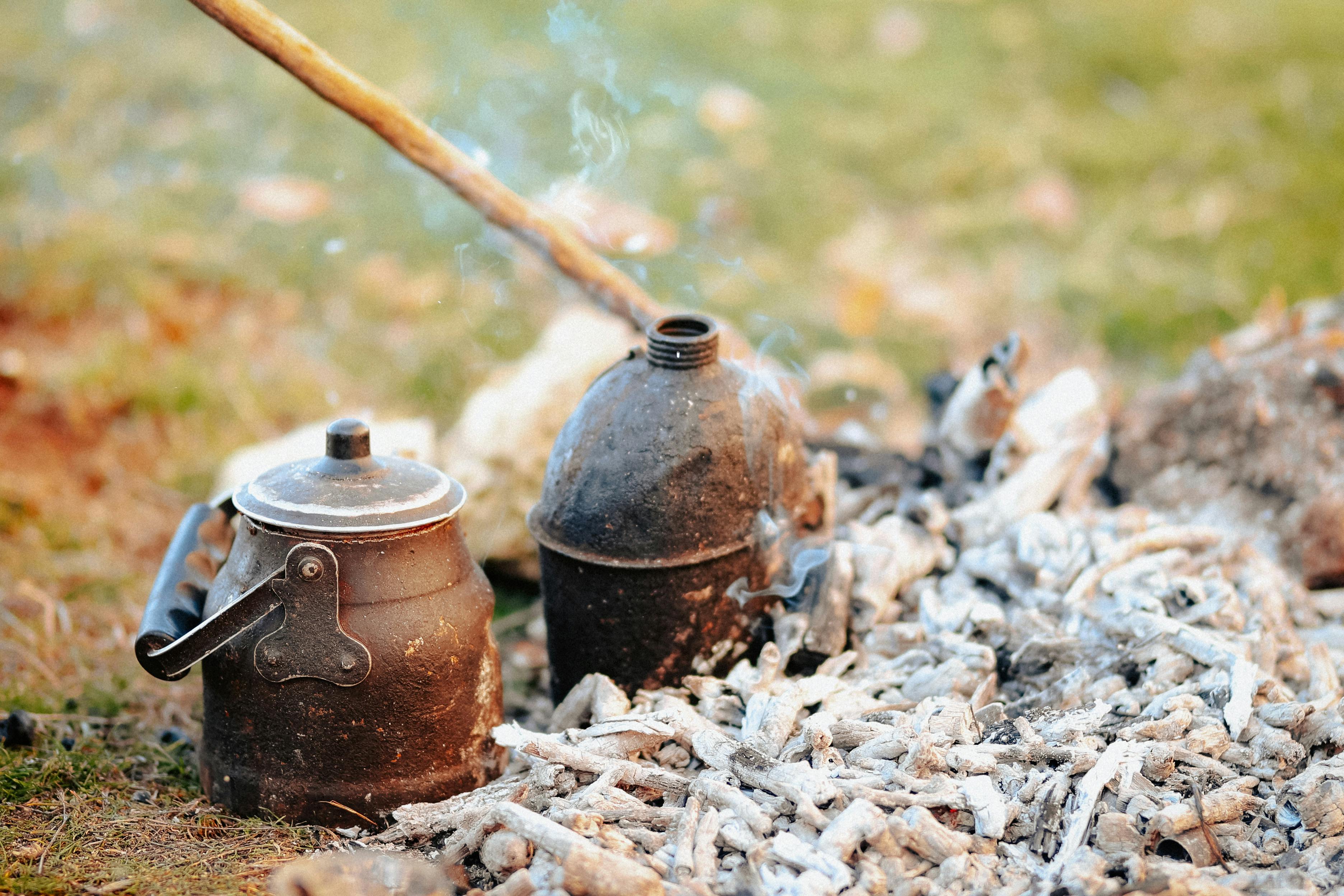Traditional Coffee Pots Over Campfire Ashes · Free Stock Photo