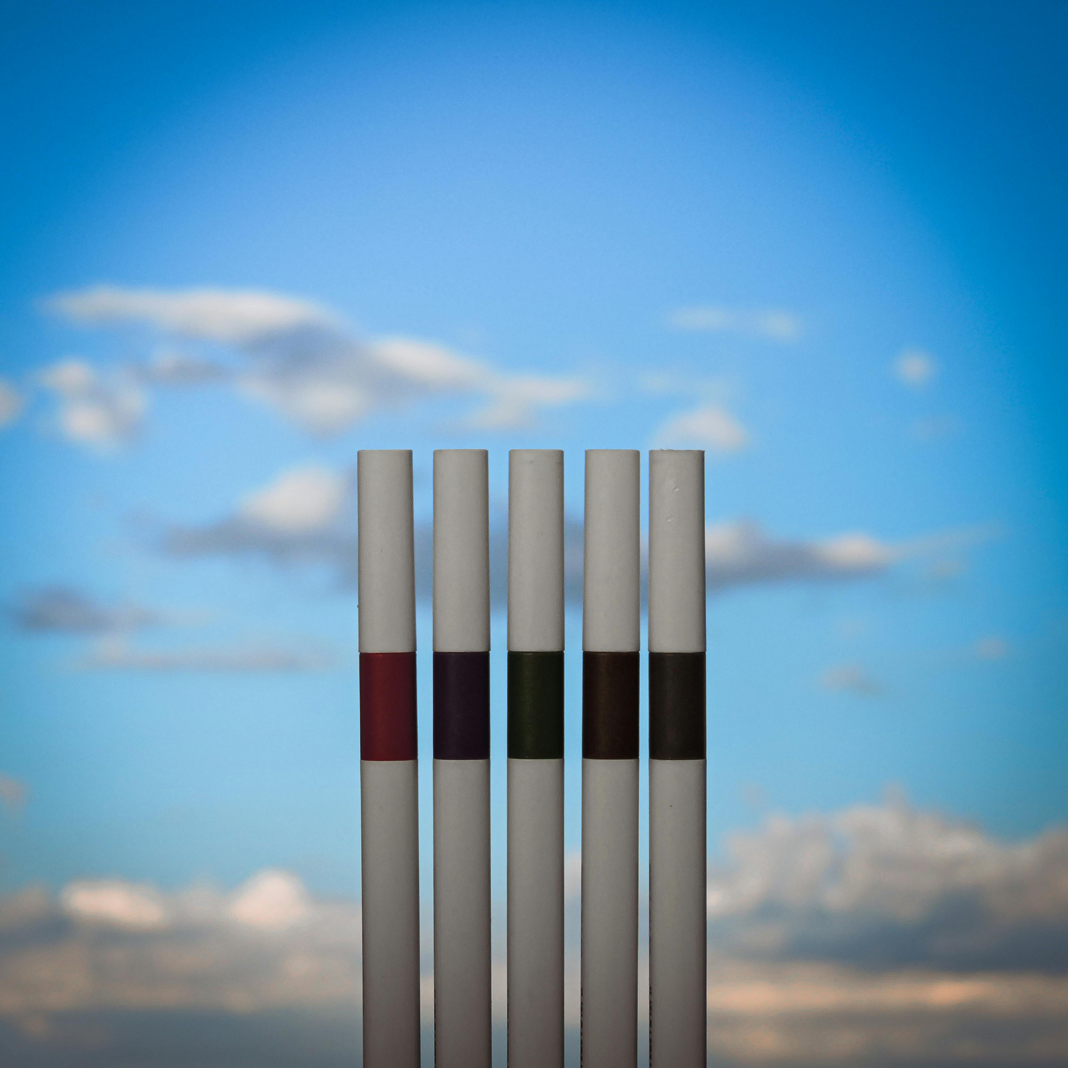 Vertical Poles Against Blue Sky in Alegrete · Free Stock Photo
