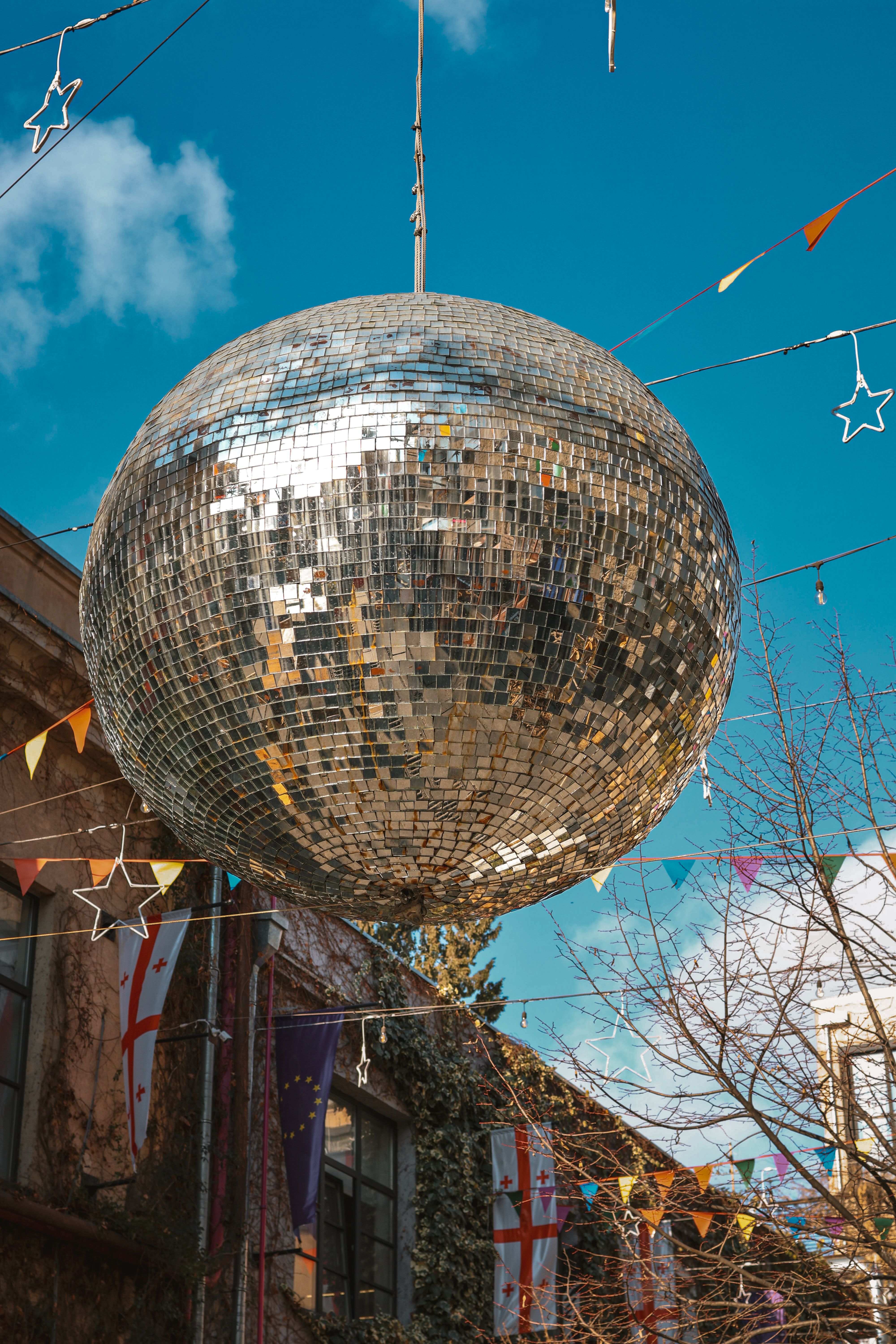 Giant Disco Ball Outdoors on a Sunny Day · Free Stock Photo