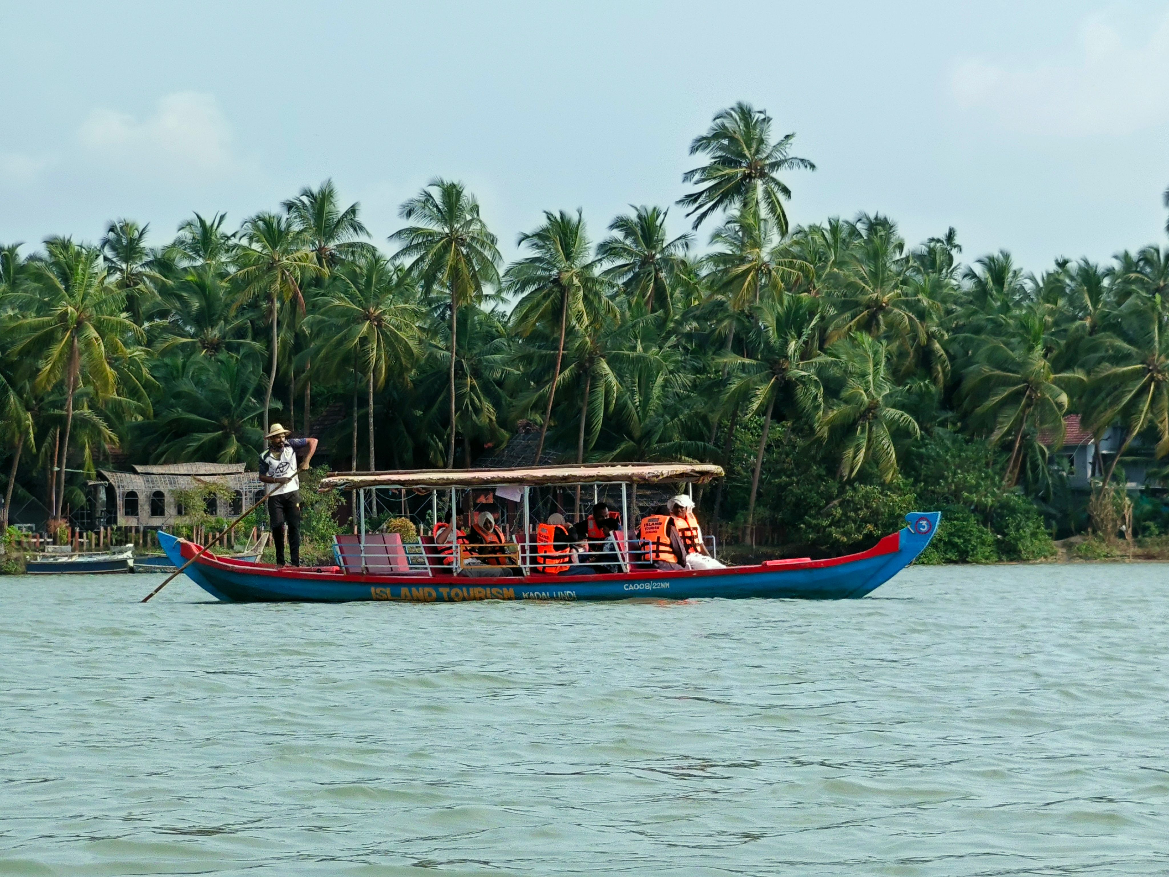 Traditional Boat Ride Through Tropical Waters · Free Stock Photo