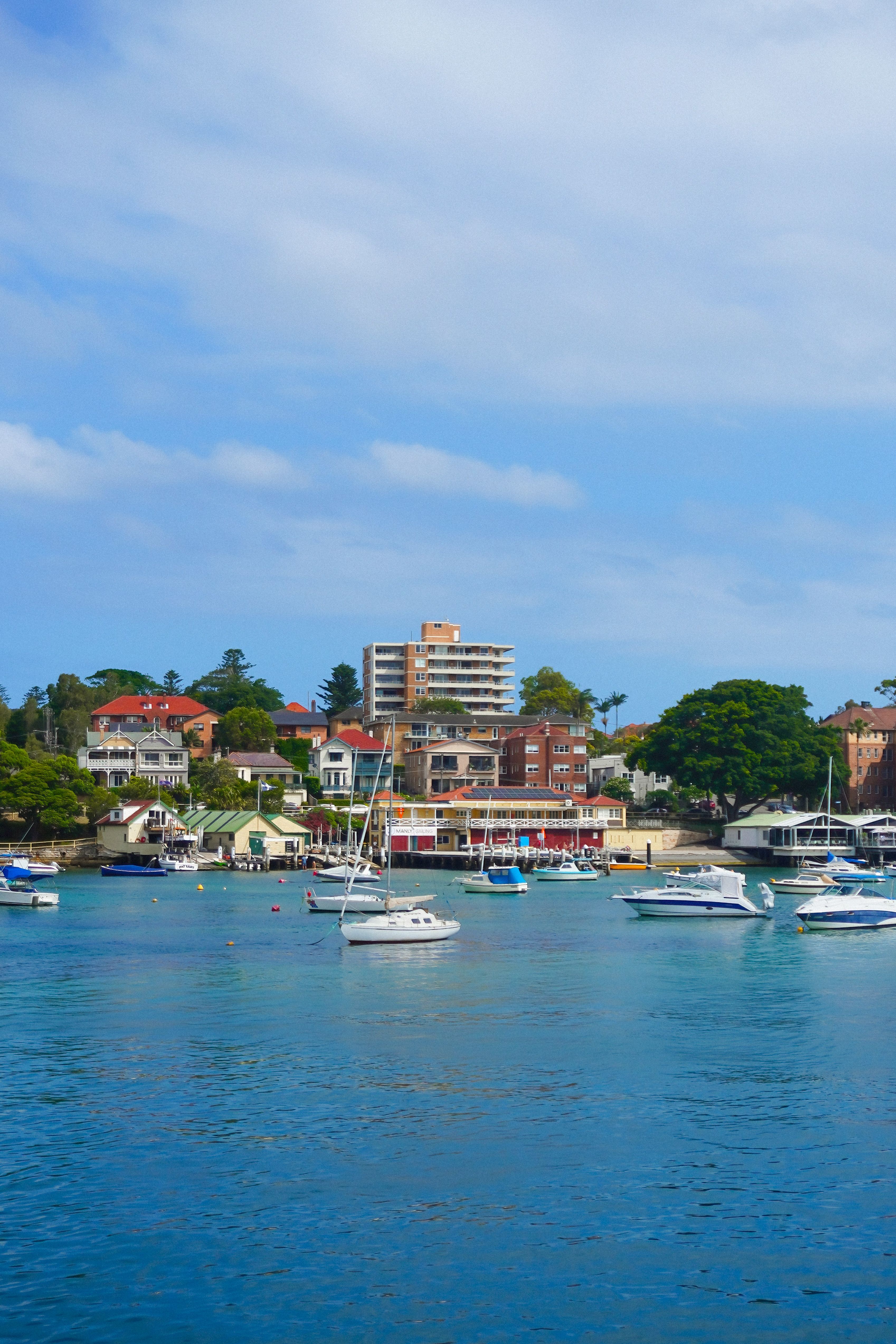 Scenic View of Waterfront Marina with Boats · Free Stock Photo