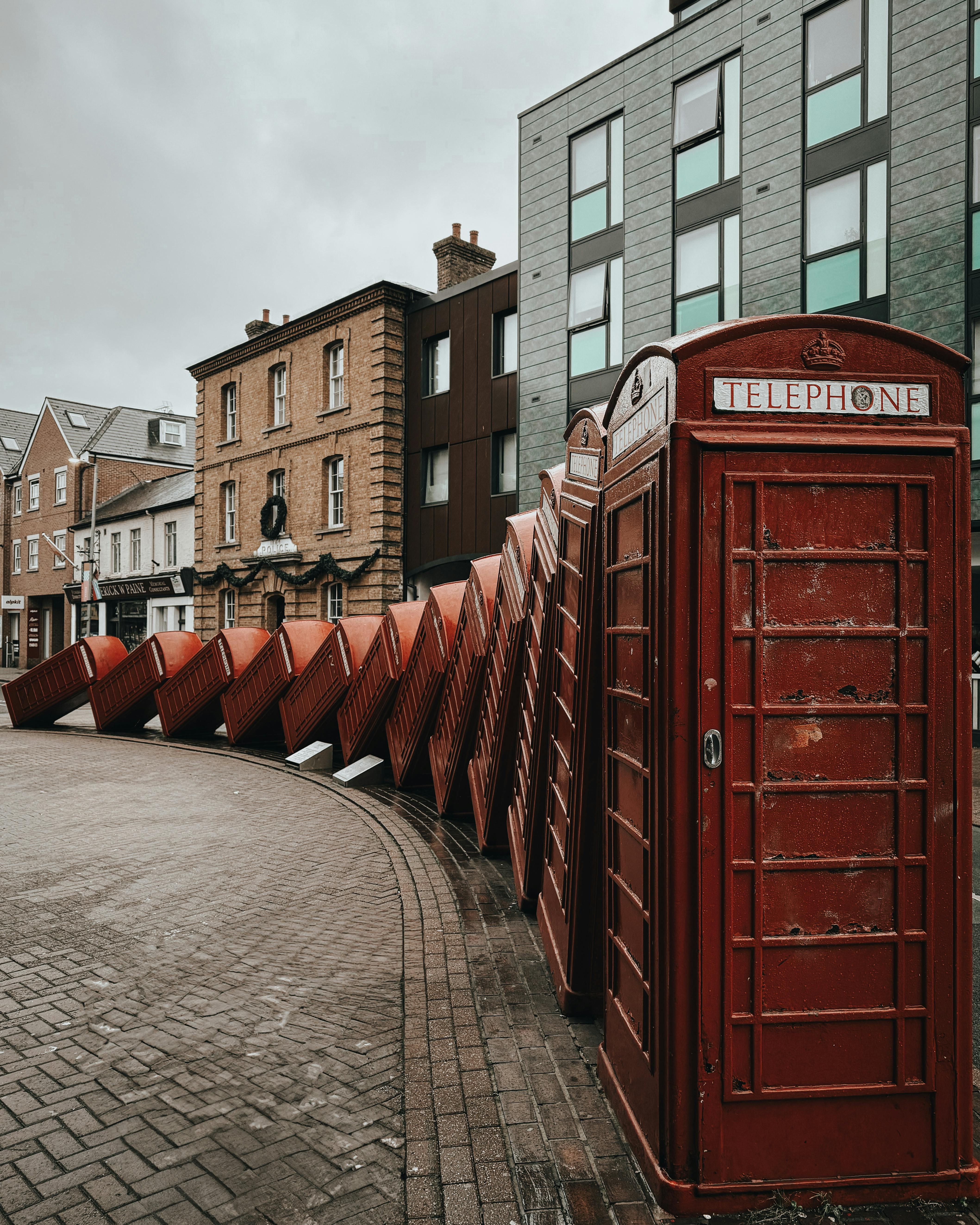 Iconic Red Telephone Booths in London Street · Free Stock Photo