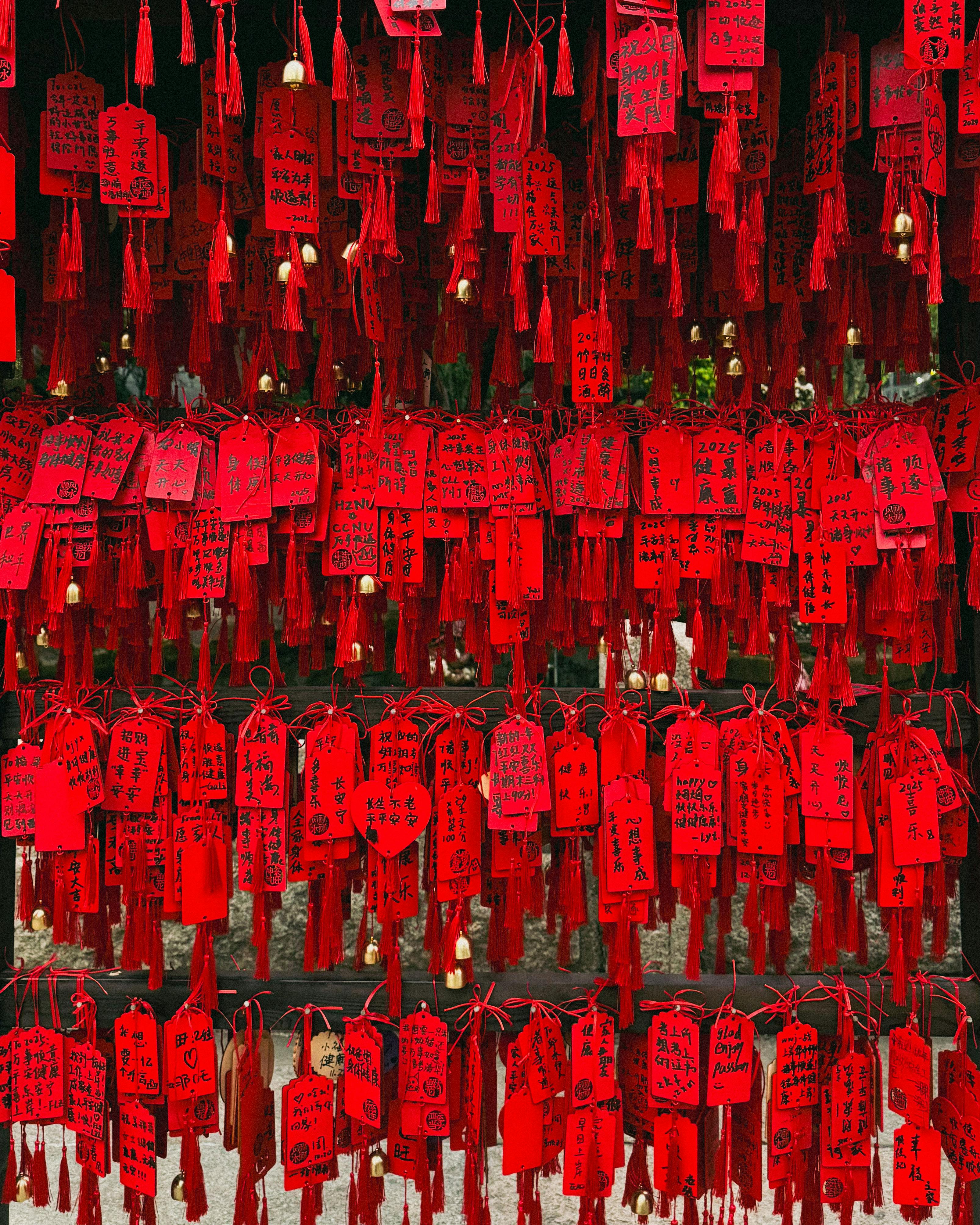 Red Wishing Tags at a Traditional Asian Temple · Free Stock Photo