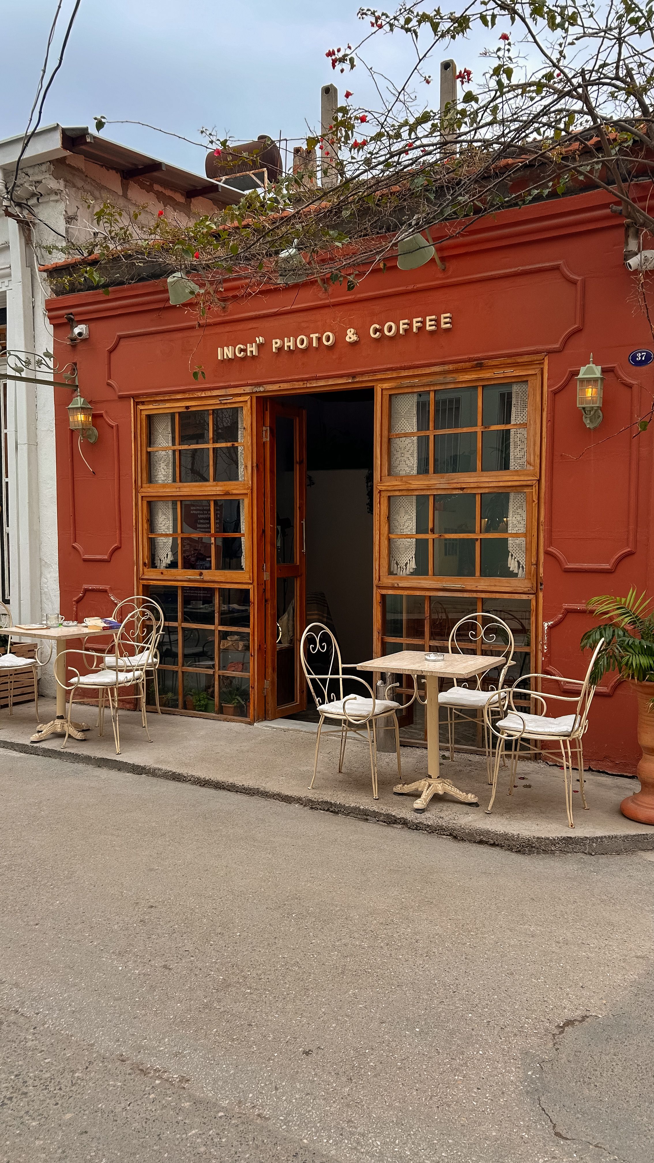 Charming Outdoor Cafe with Classic Decor · Free Stock Photo
