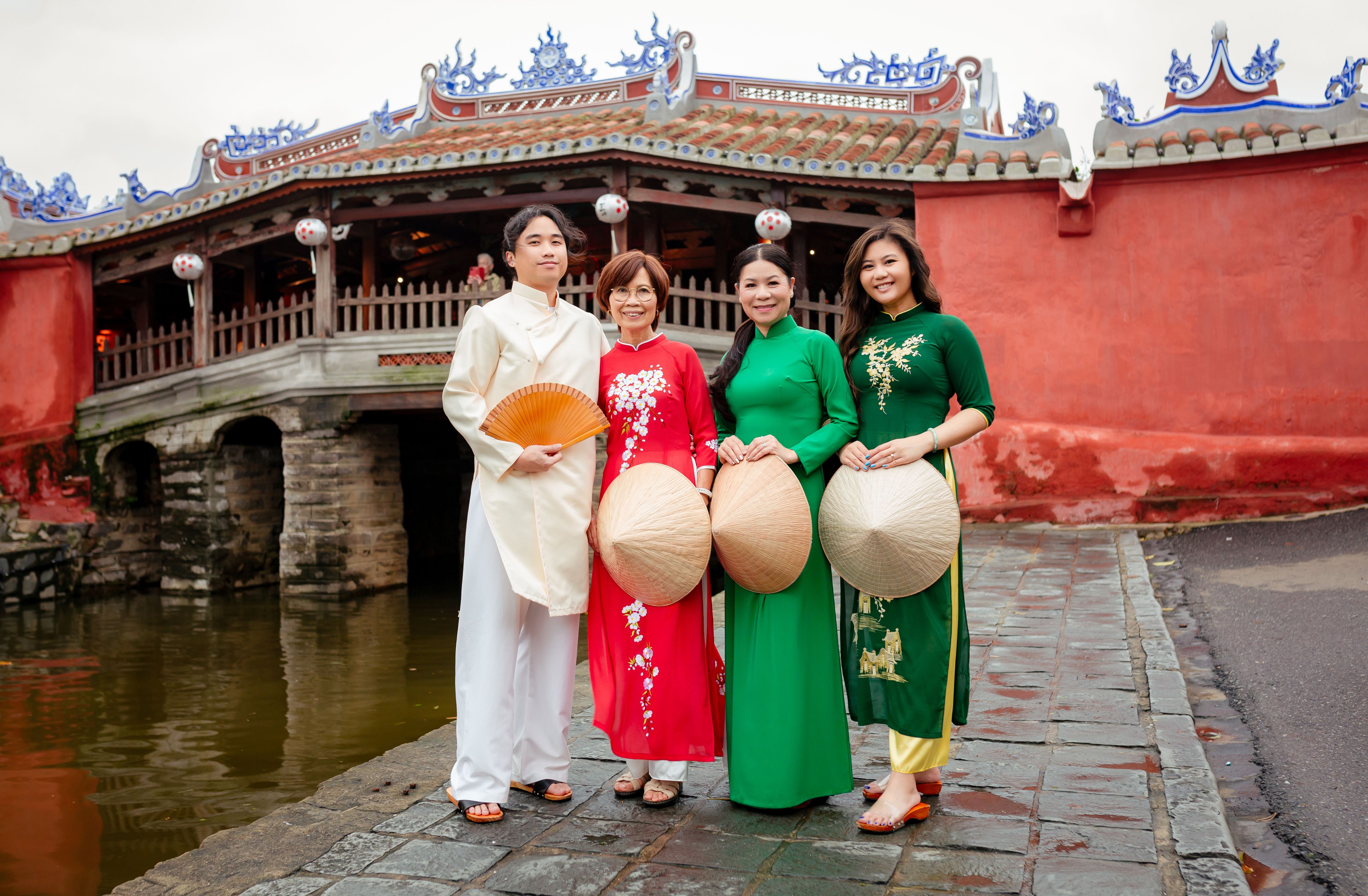 Traditional Vietnamese Attire by Japanese Bridge · Free Stock Photo