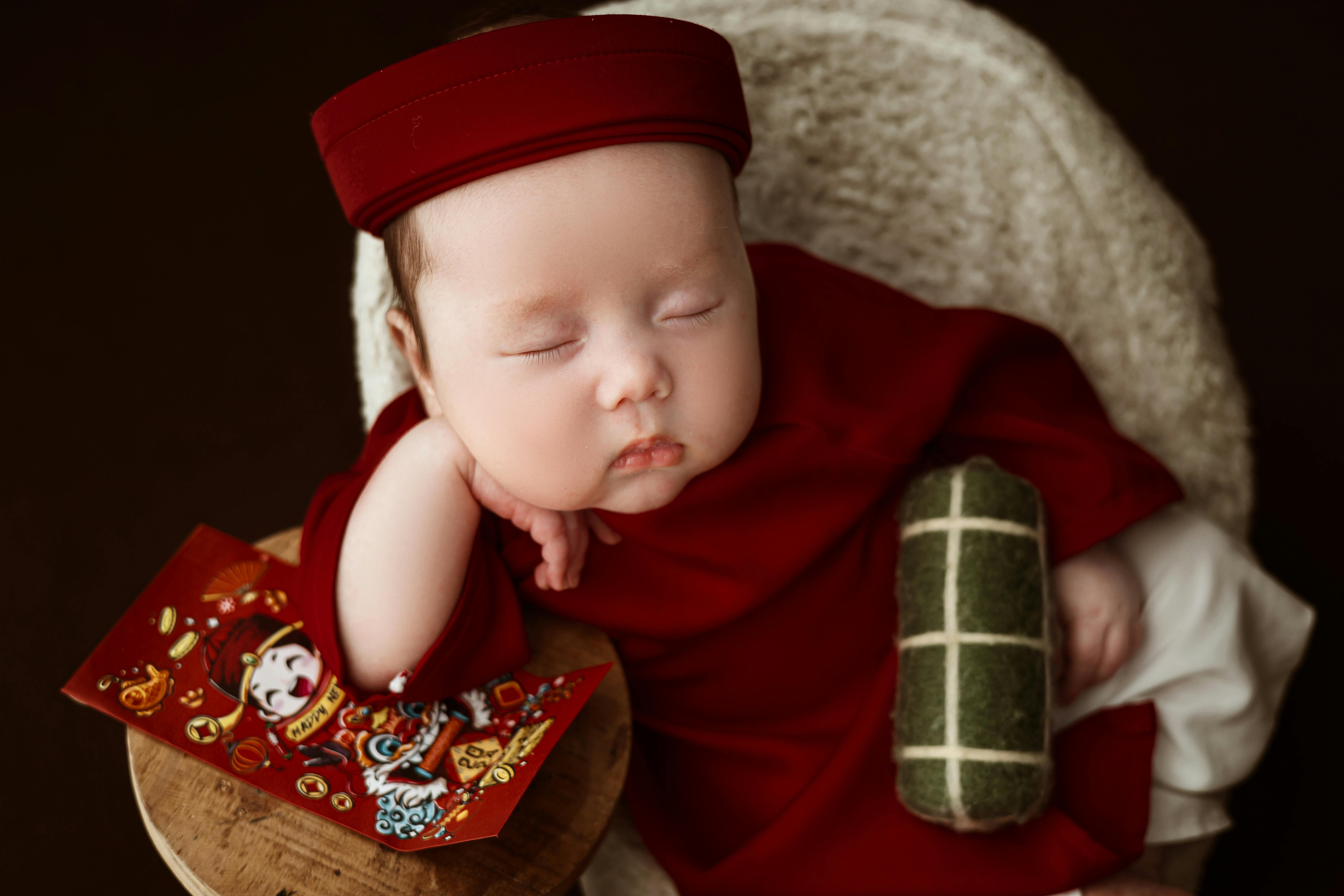 Sleeping Baby in Traditional Vietnamese Attire · Free Stock Photo