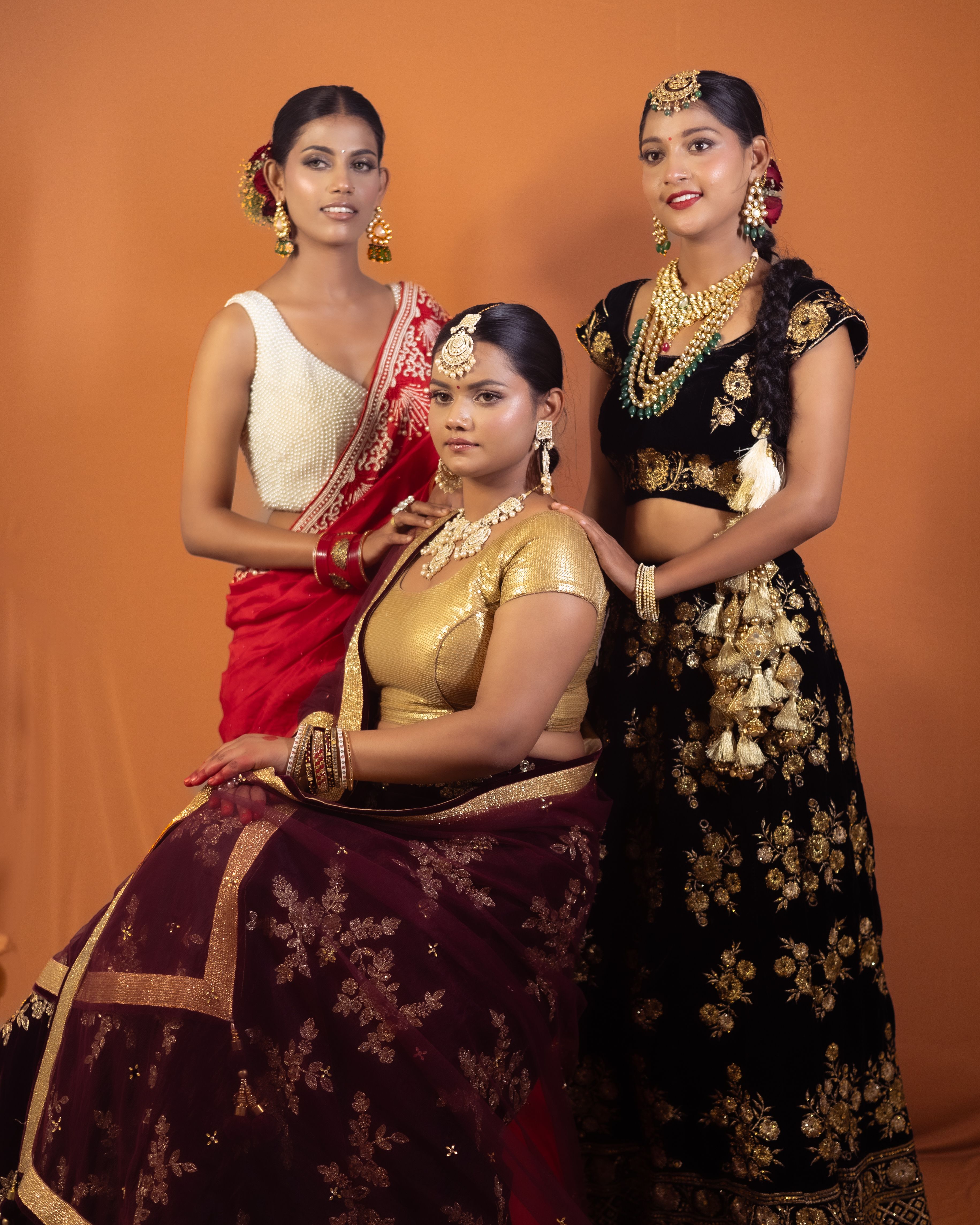 Elegant Portrait of Women in Traditional Attire · Free Stock Photo