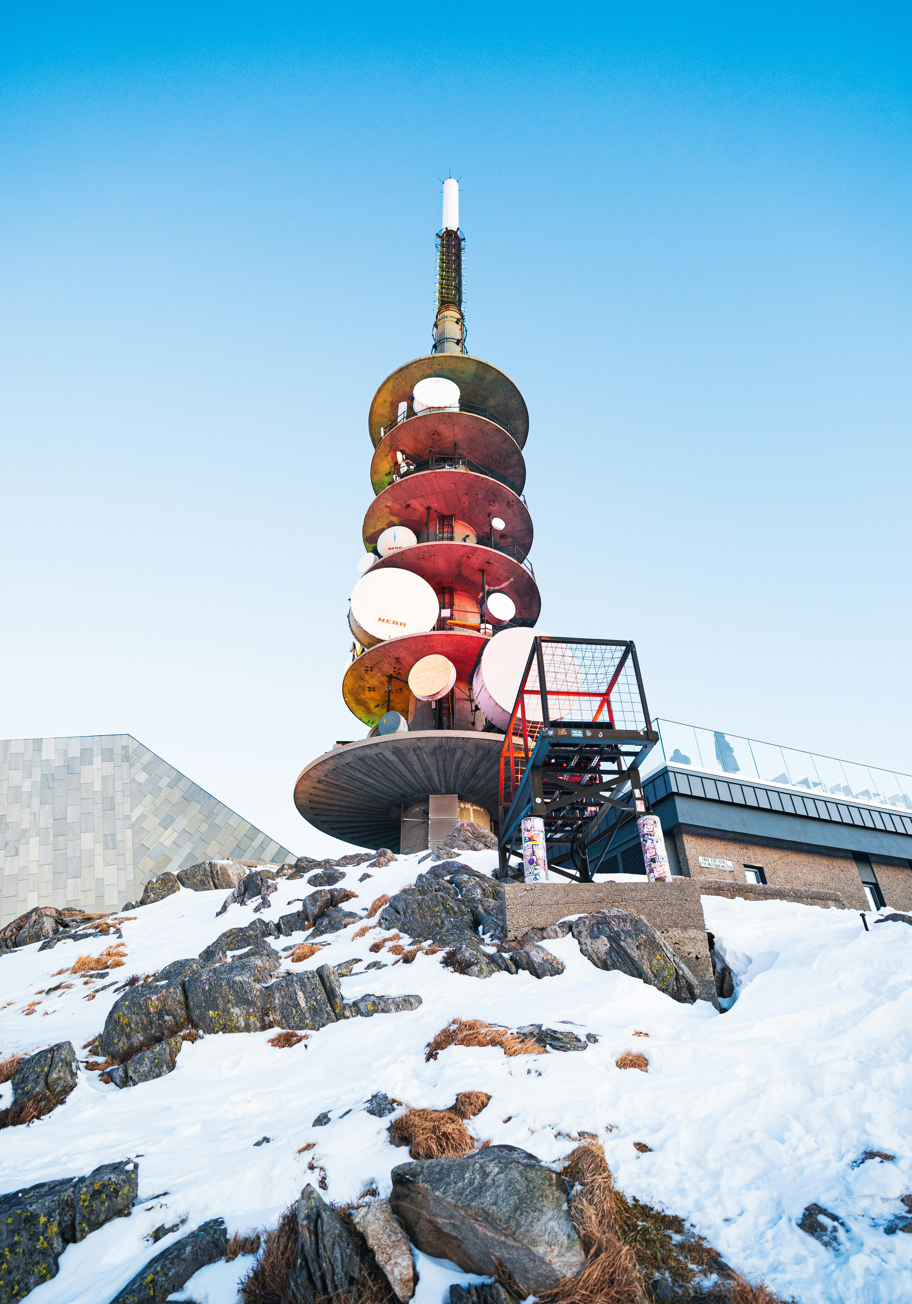 Telemetry Tower in Snowy Landscape with Clear Sky · Free Stock Photo