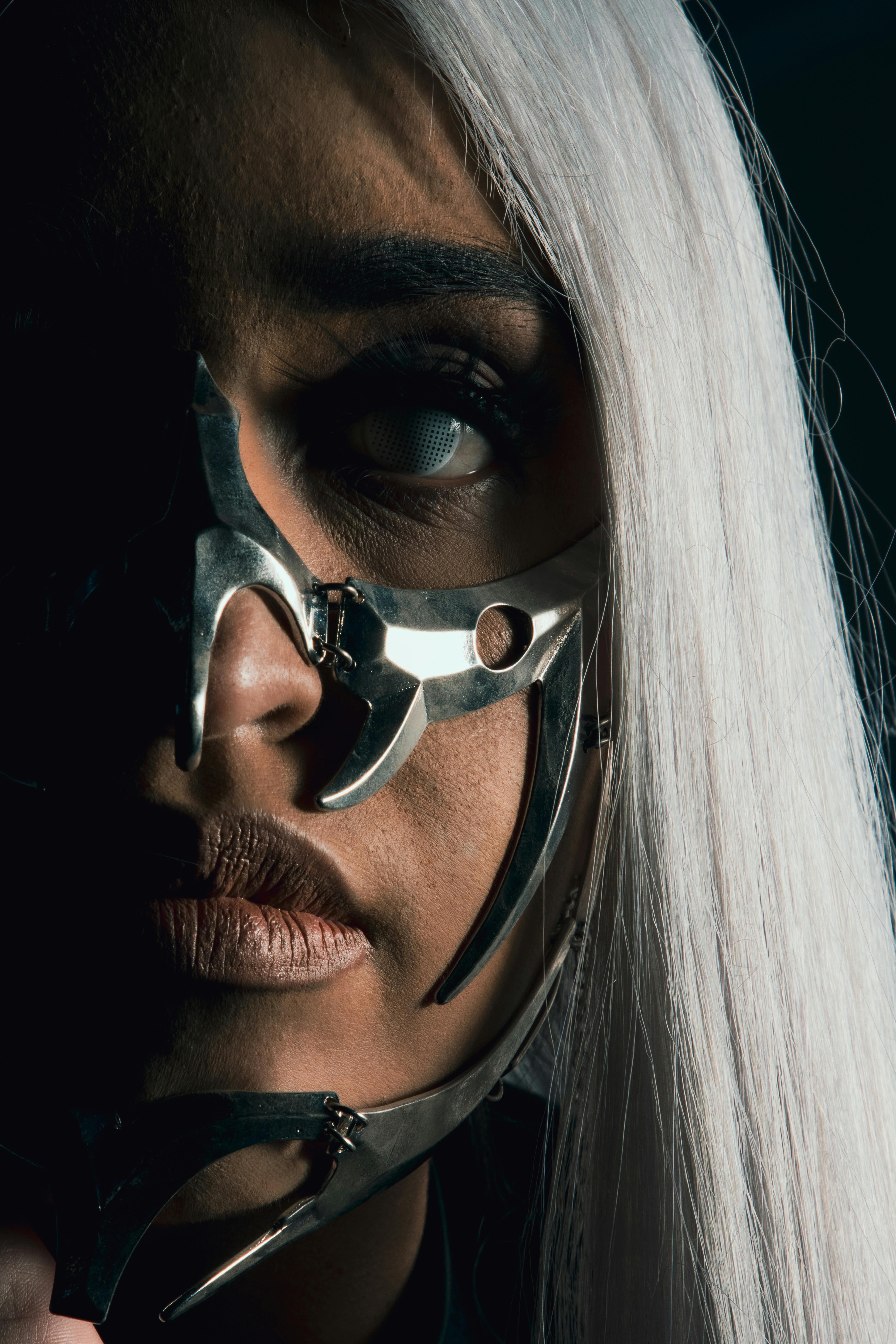 Futuristic Woman with Metallic Face Mask · Free Stock Photo