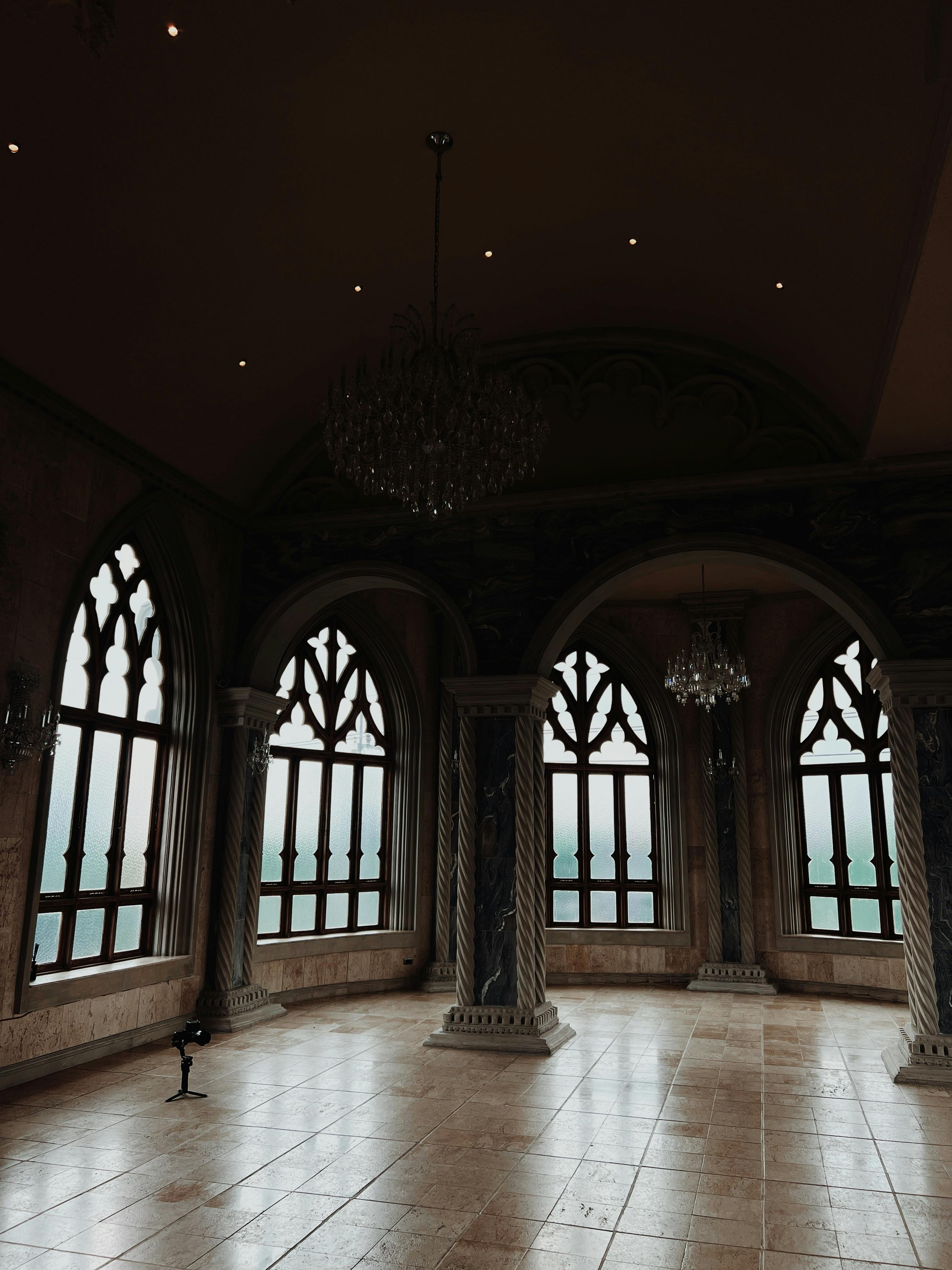 Elegant Gothic Revival Interior with Large Windows · Free Stock Photo