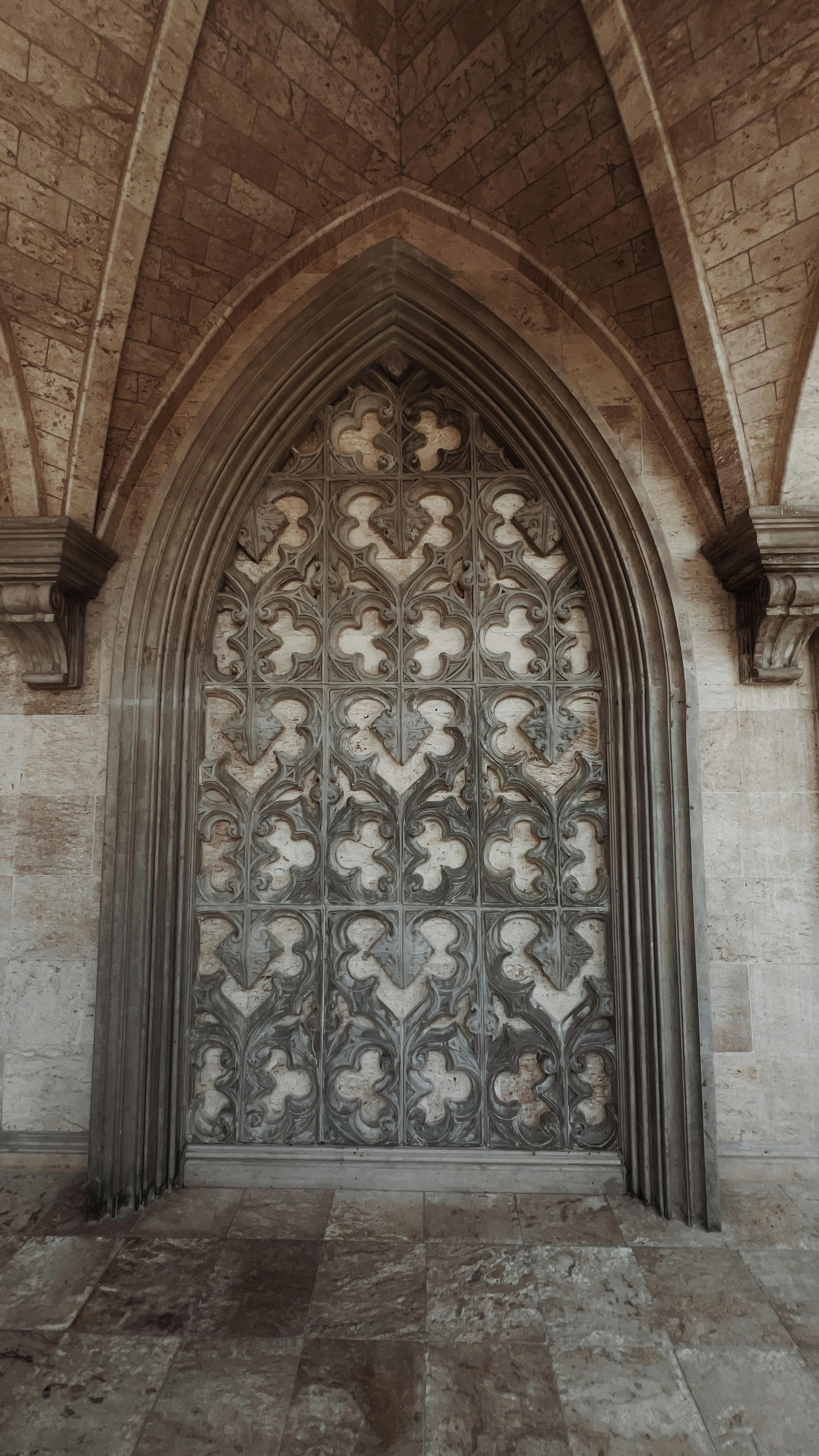 Gothic Archway with Intricate Stone Design · Free Stock Photo