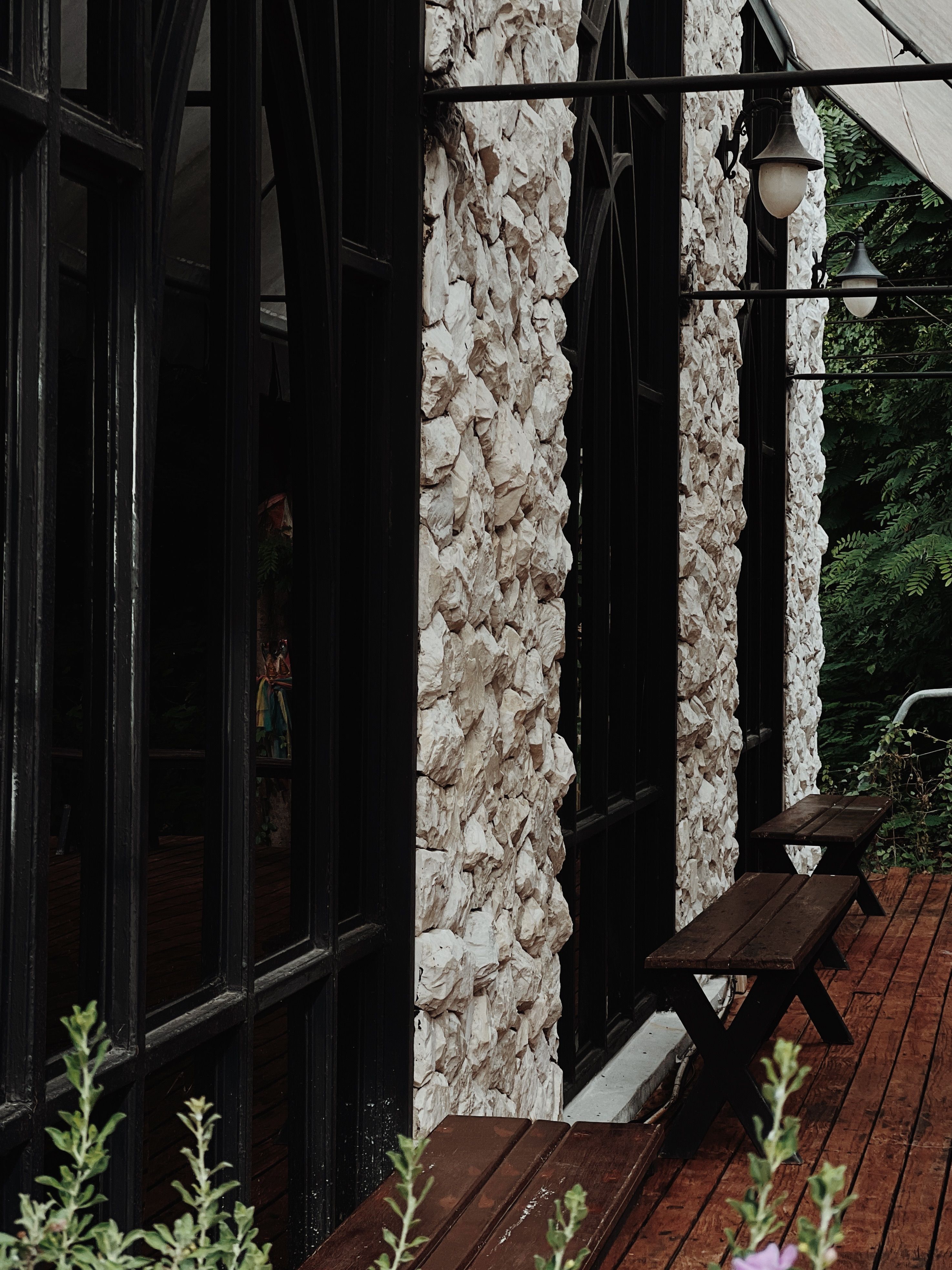 Charming Rustic Outdoor Cafe Terrace Setting · Free Stock Photo
