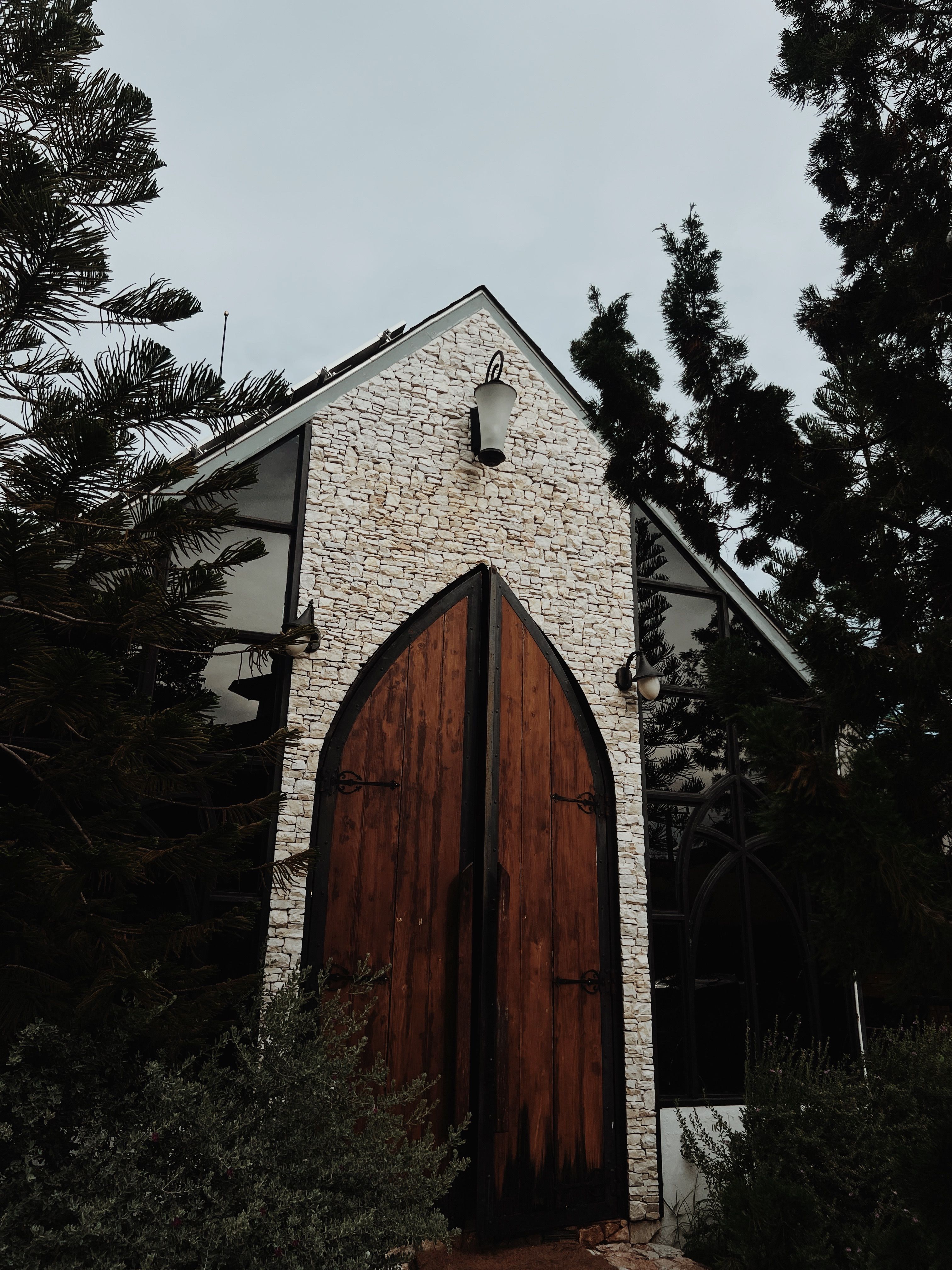 Charming Rustic Church Façade in Nature · Free Stock Photo