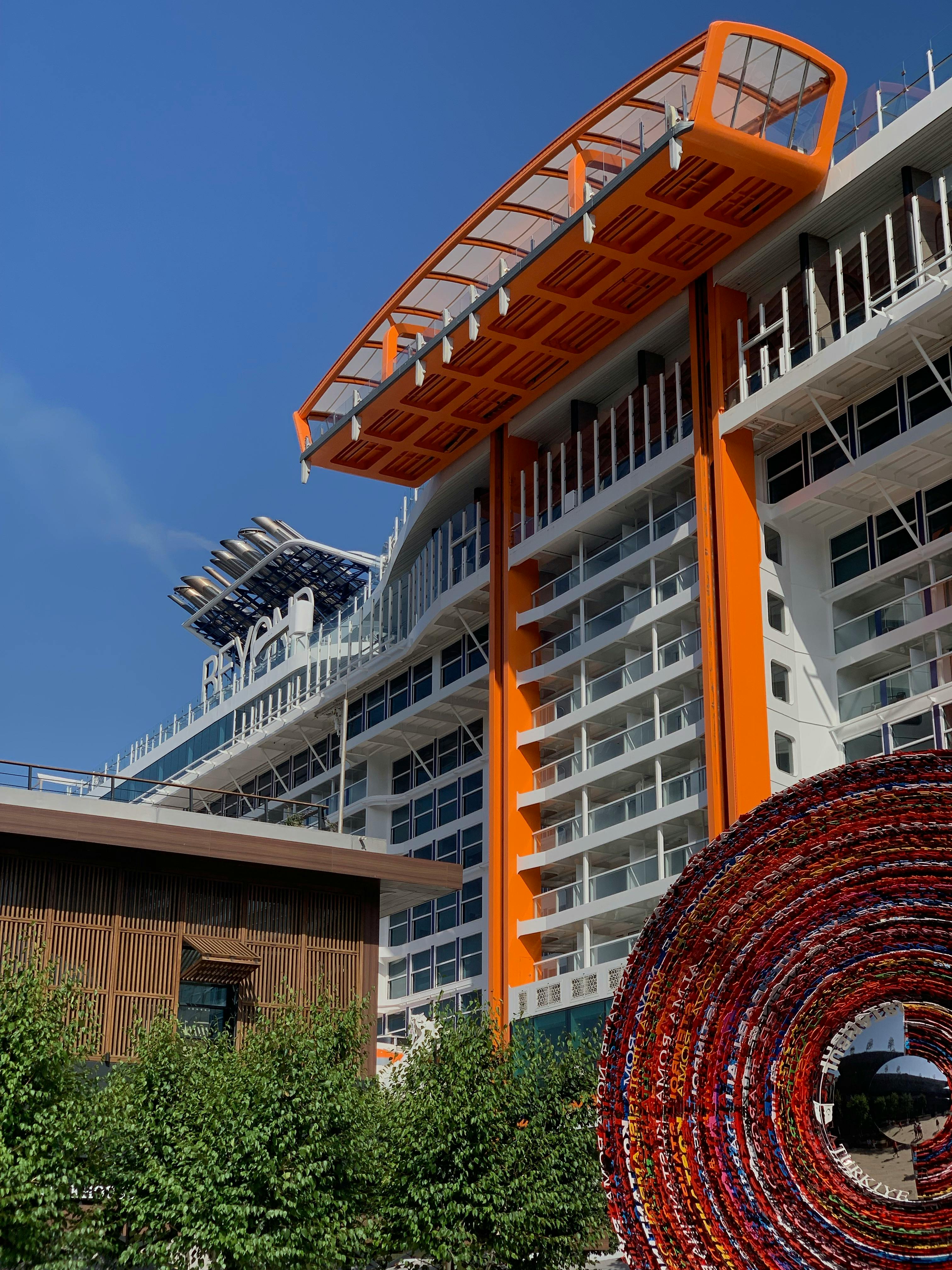 Modern Building with Orange Architectural Features · Free Stock Photo