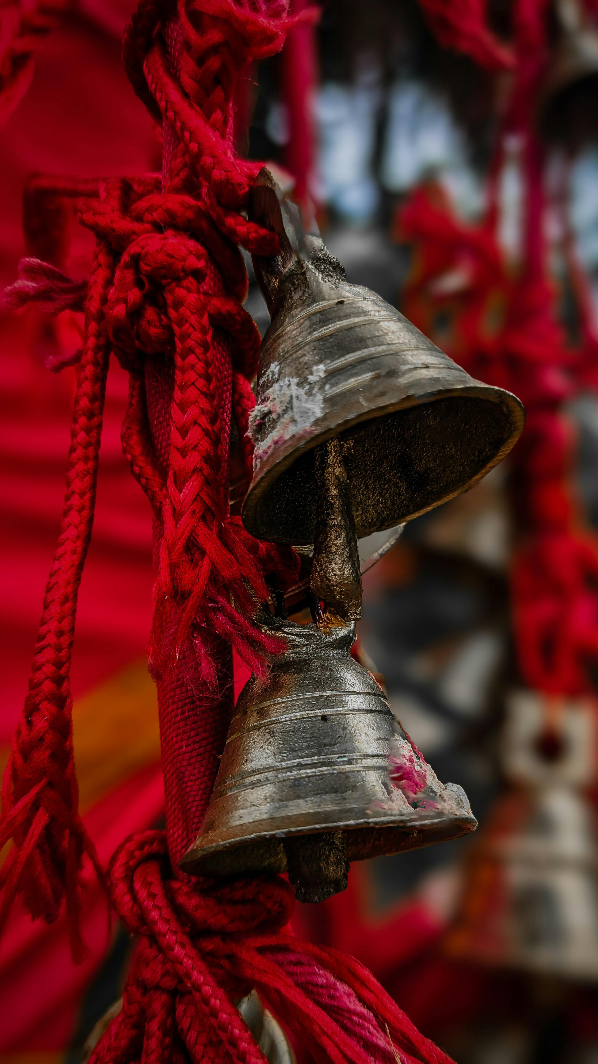 Hindu Temple Bells with Red Threads · Free Stock Photo