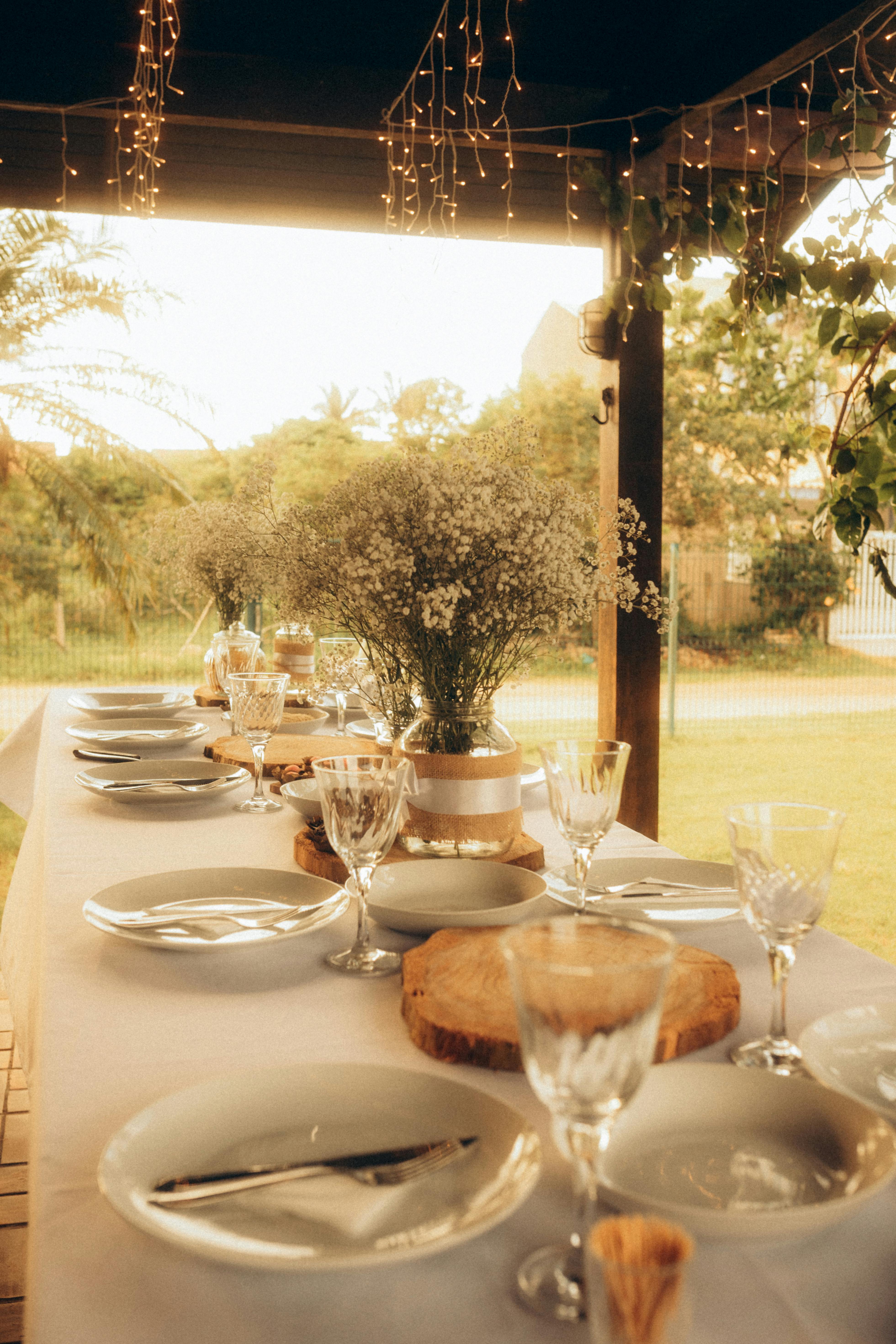 Elegant Outdoor Dining Setup with Rustic Decor · Free Stock Photo
