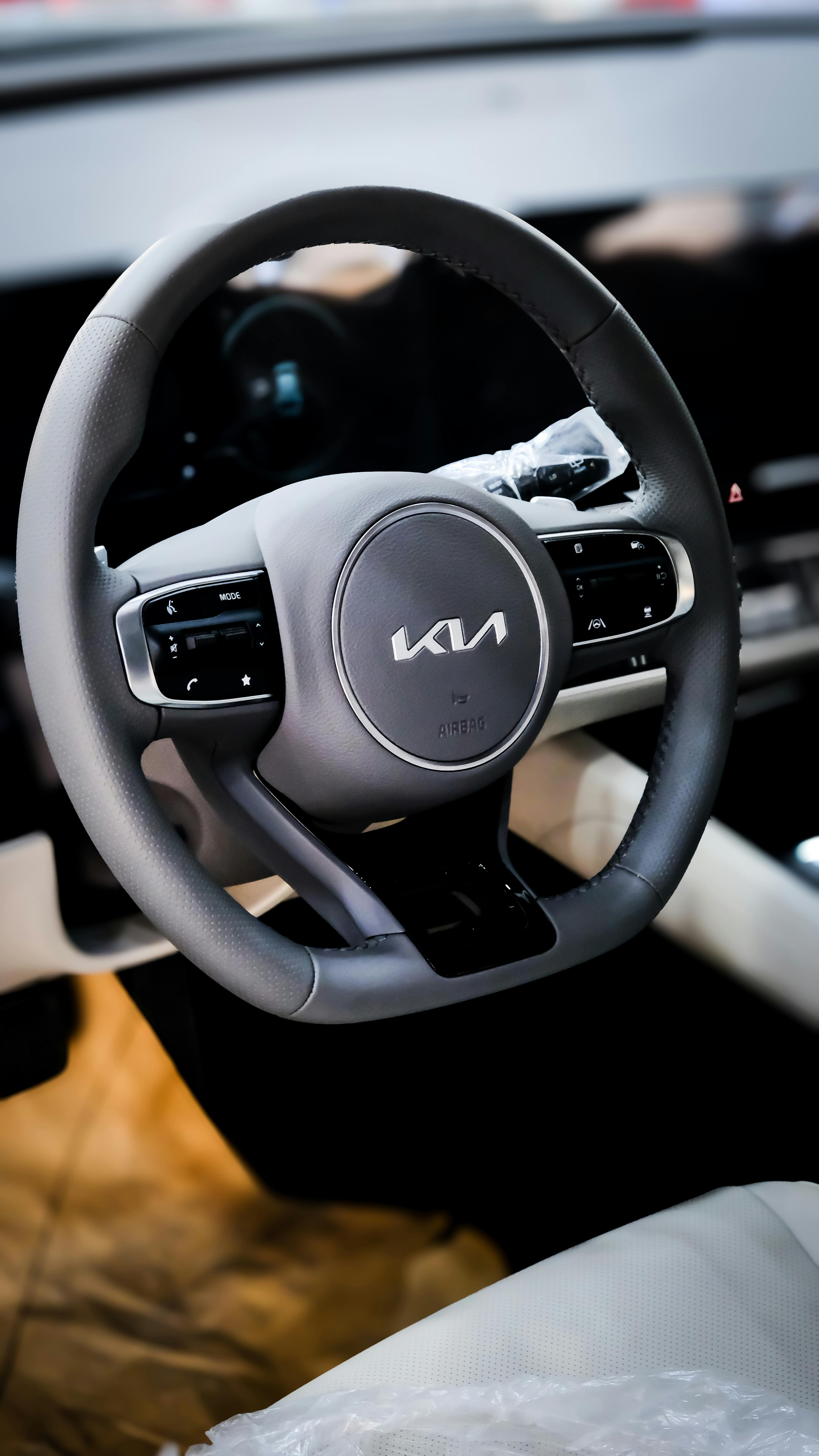Modern Kia Steering Wheel in Car Interior · Free Stock Photo