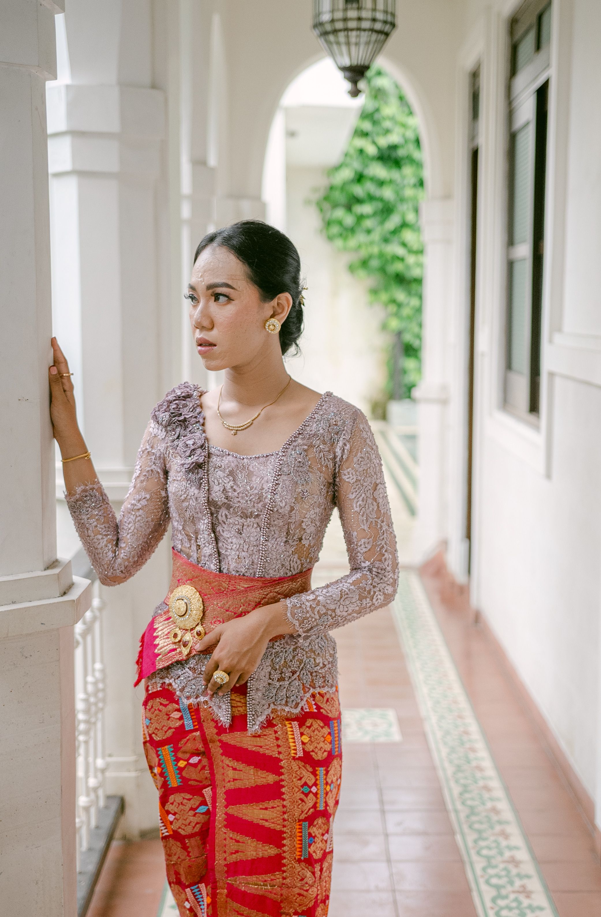 Traditional Attire in Elegant Setting Indoors · Free Stock Photo