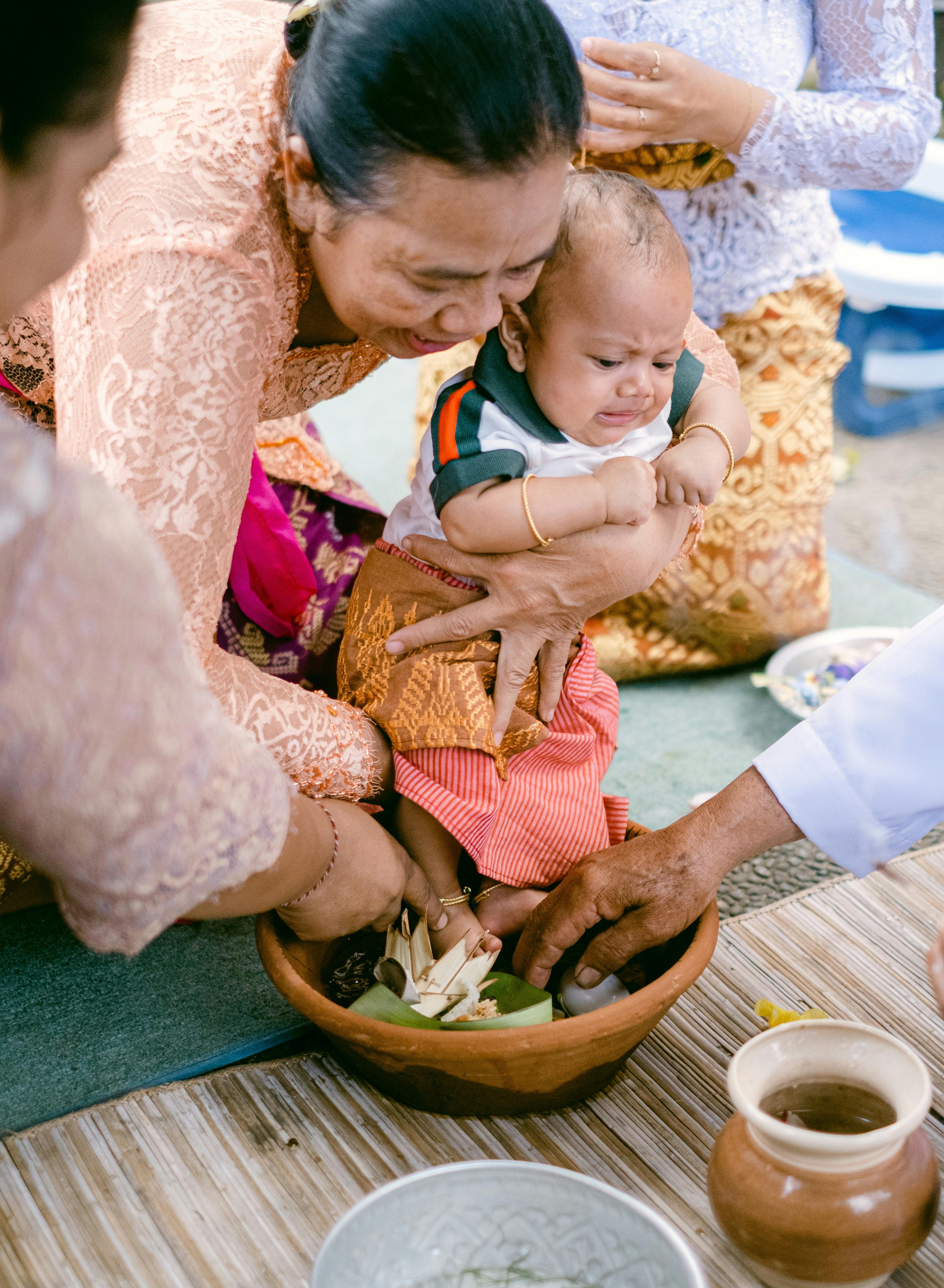 Traditional Indonesian Baby Ceremony Outdoors · Free Stock Photo