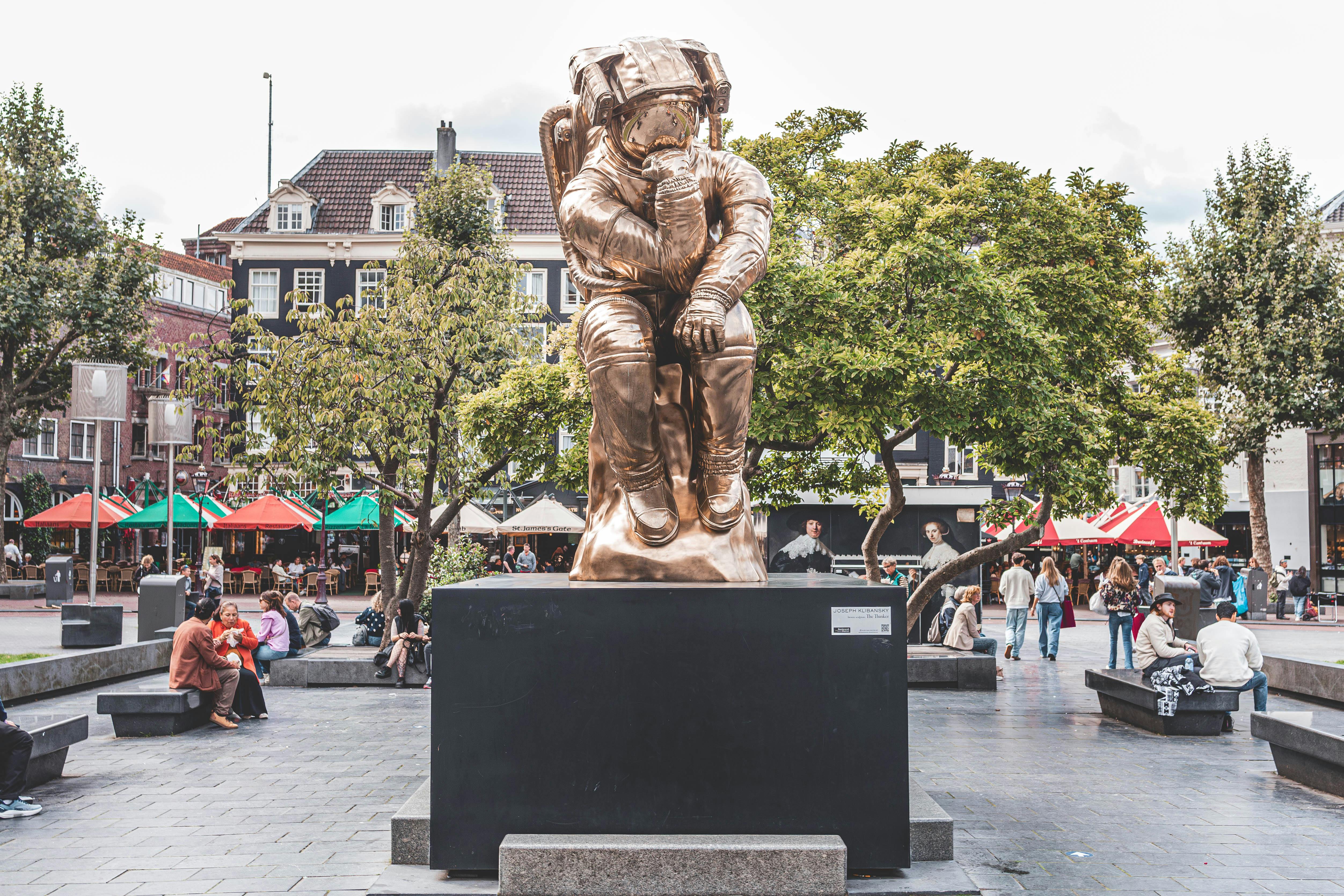 Golden Astronaut Statue in Amsterdam · Free Stock Photo