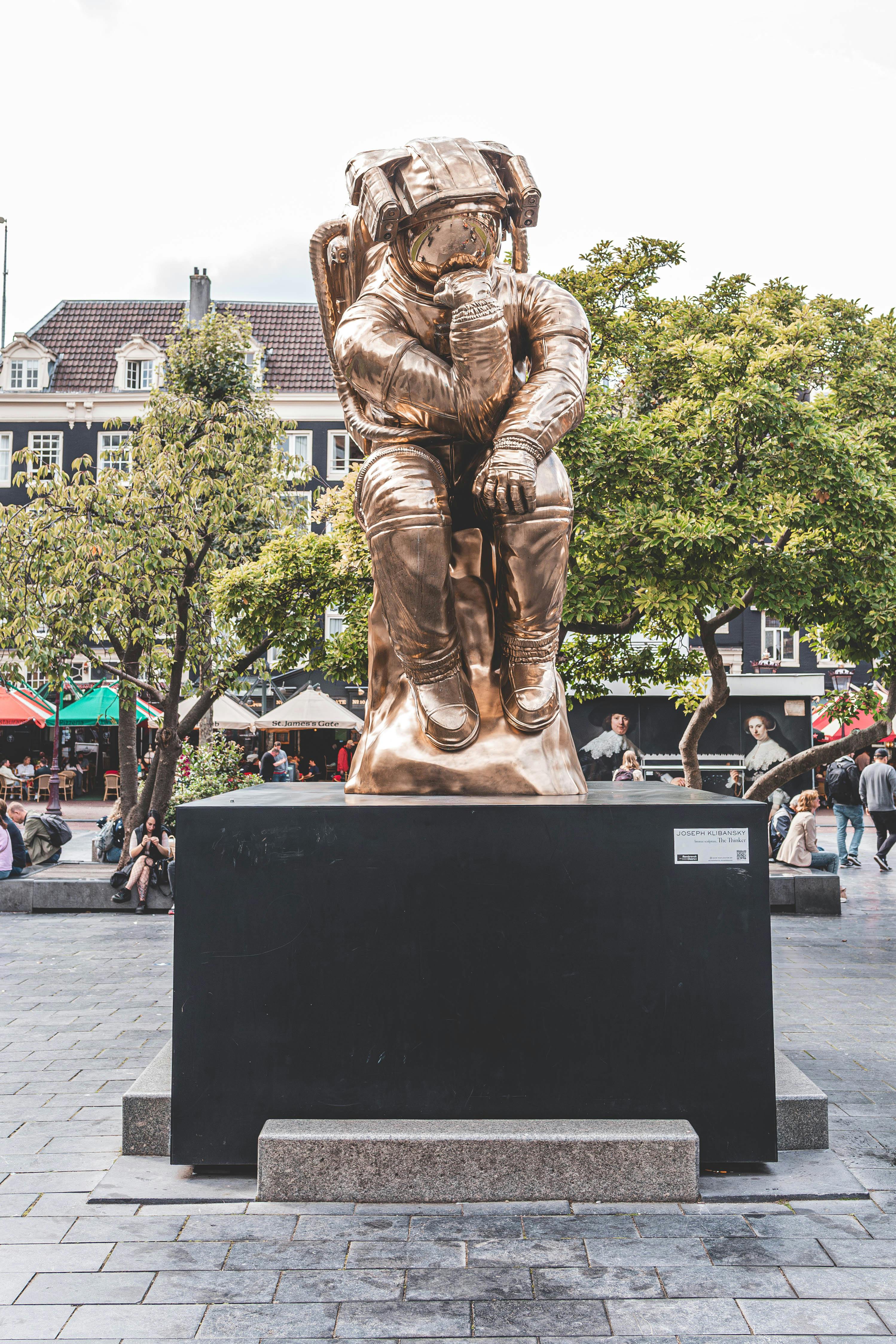 Golden Astronaut Sculpture in Amsterdam · Free Stock Photo