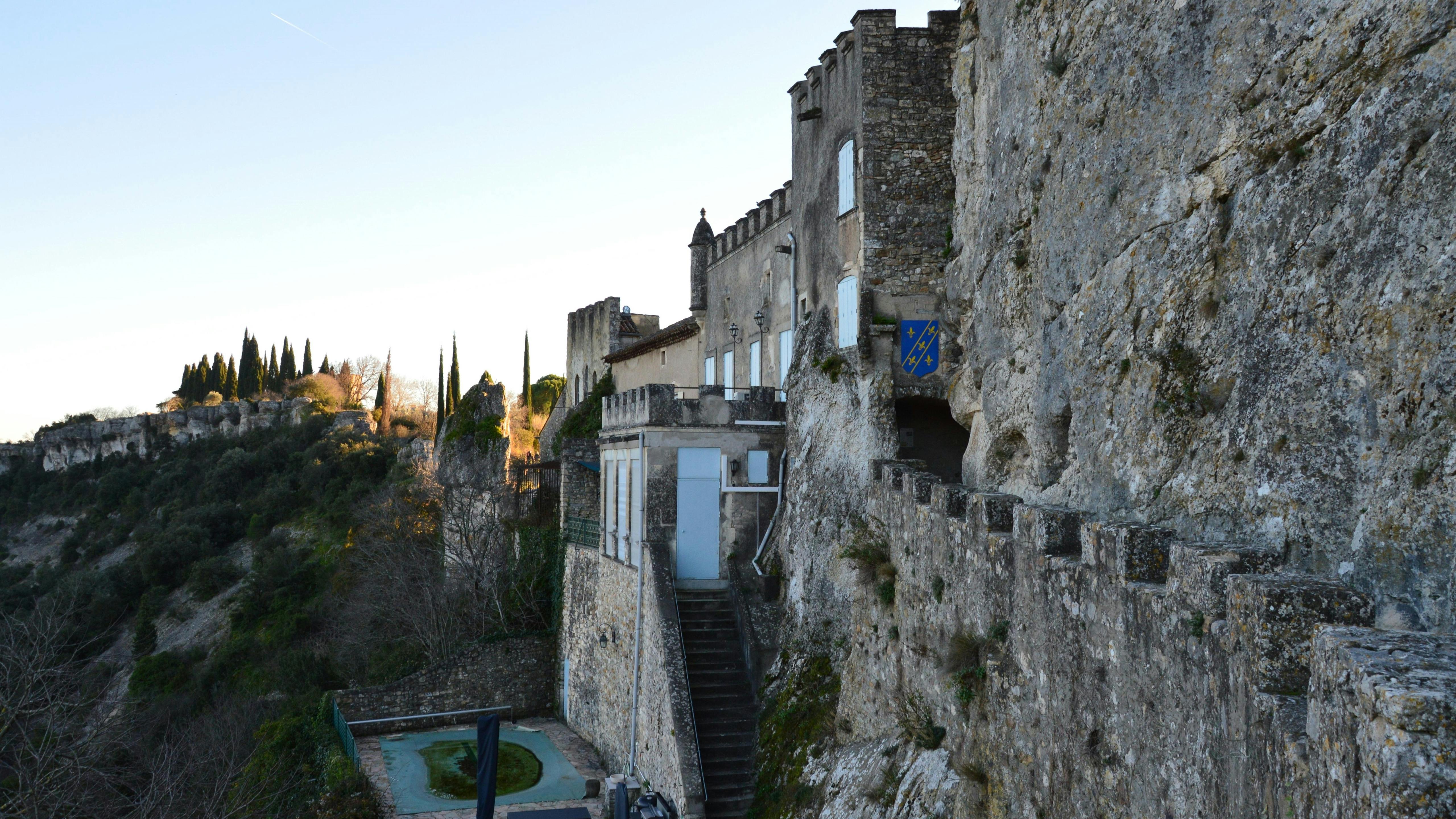 Medieval Castle Built into Rocky Cliffs · Free Stock Photo
