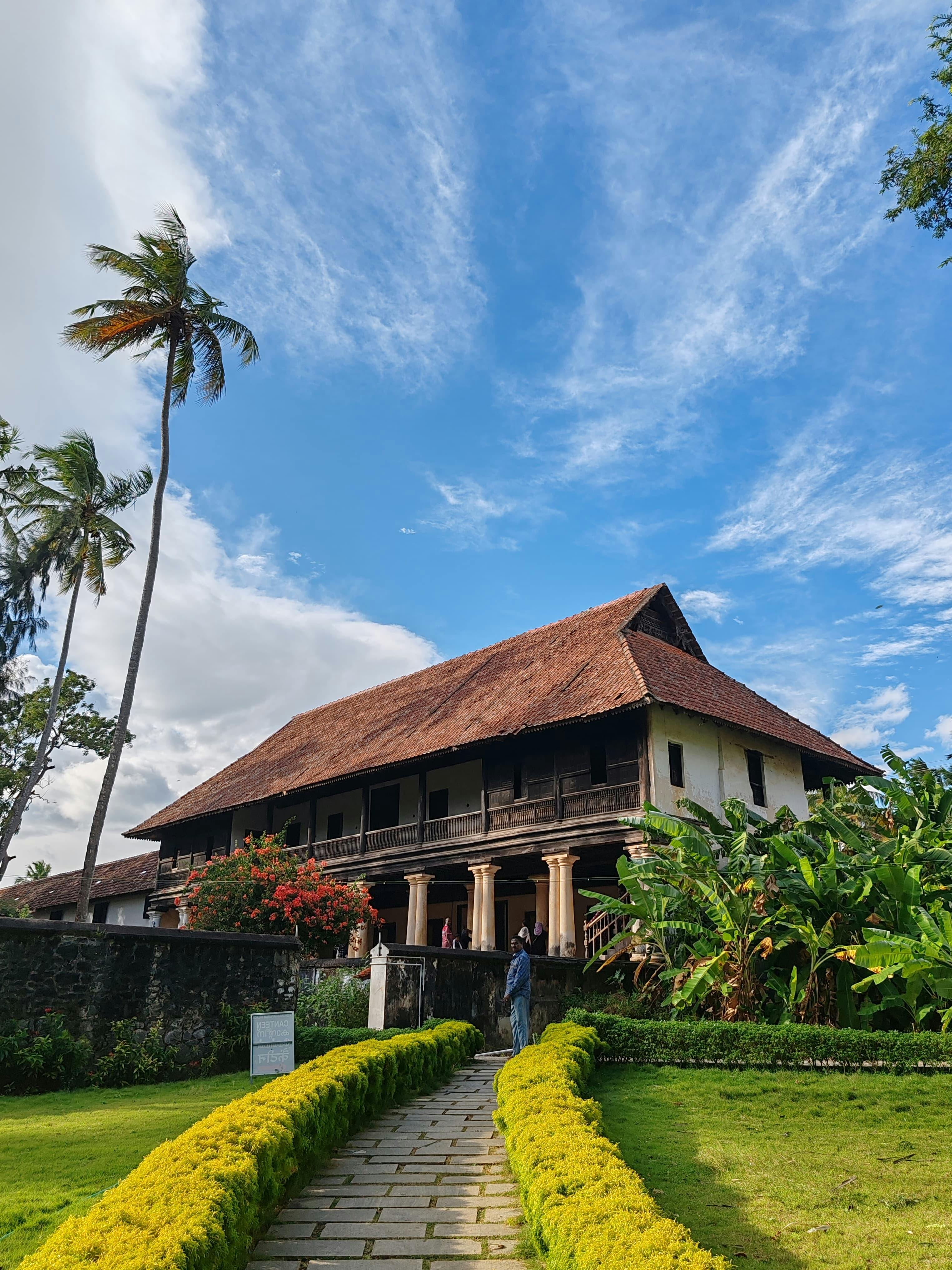 Rustic Colonial House Surrounded by Lush Garden · Free Stock Photo