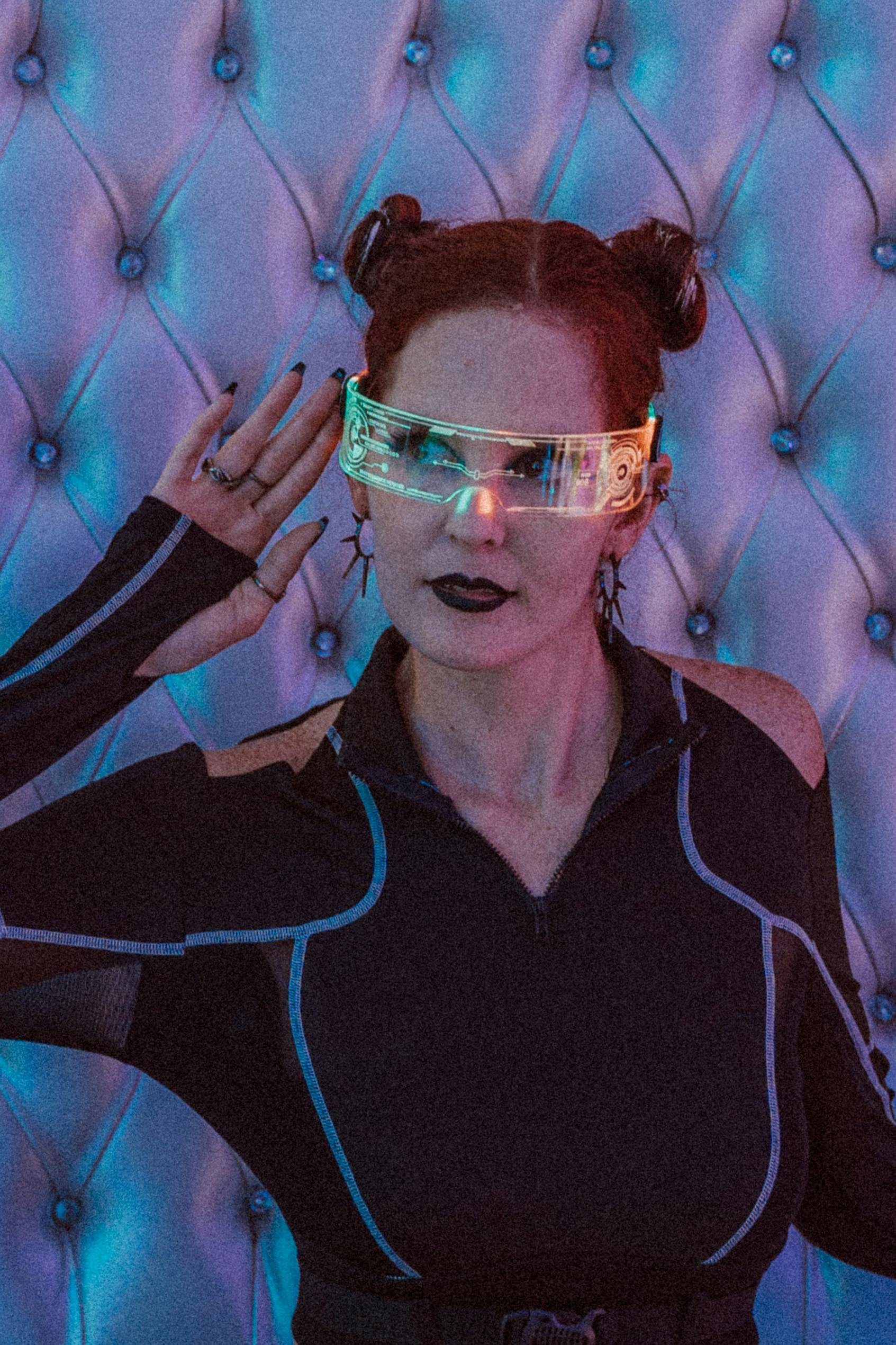 Futuristic Woman with Neon Visor in Cyber Outfit · Free Stock Photo