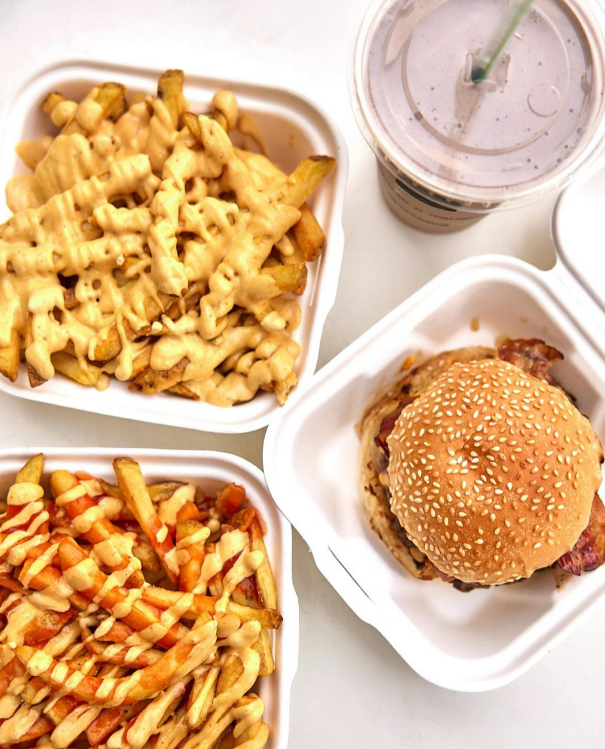 Delicious Cheeseburger and Fries Takeout · Free Stock Photo