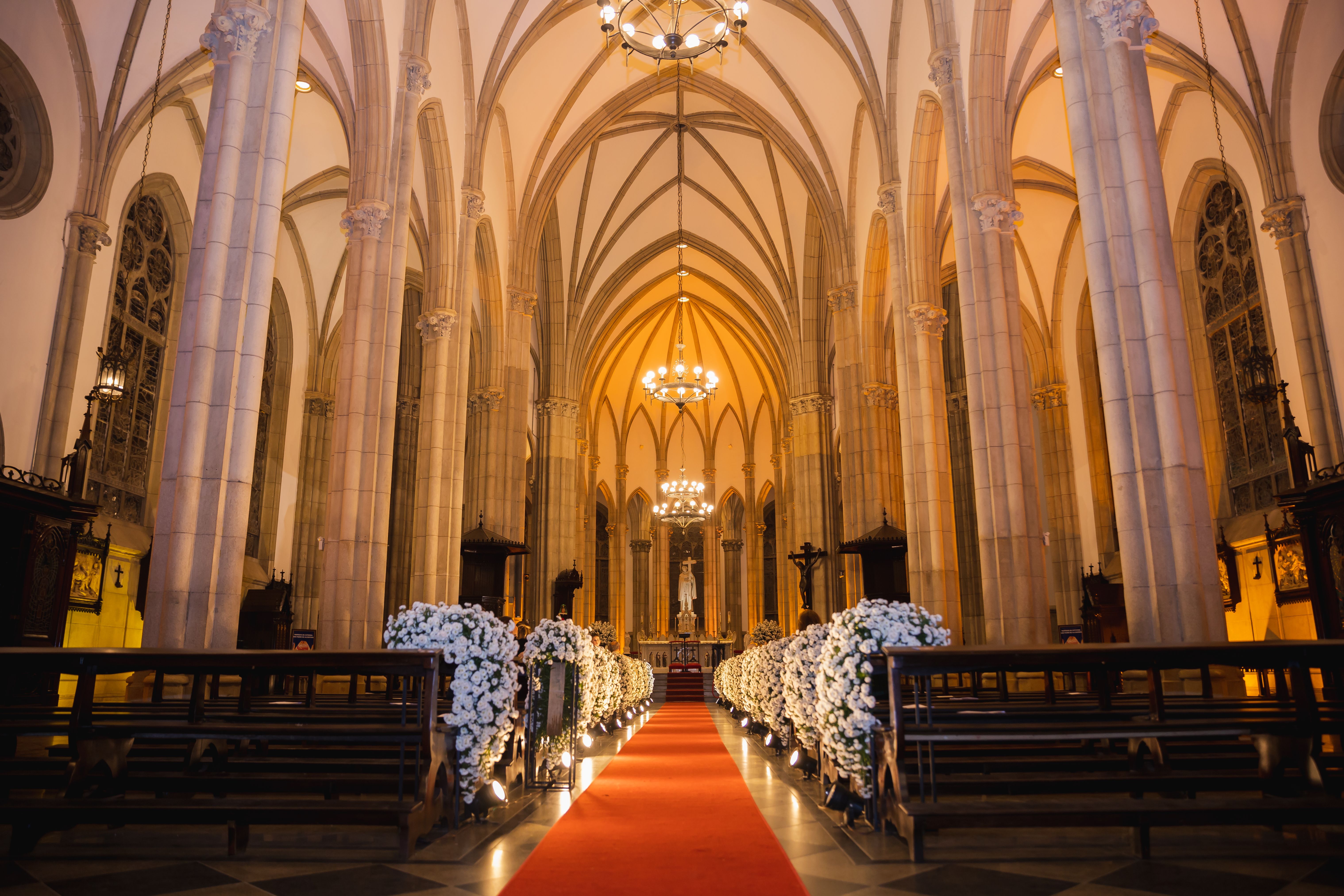 Elegant Cathedral Interior with Floral Decorations · Free Stock Photo
