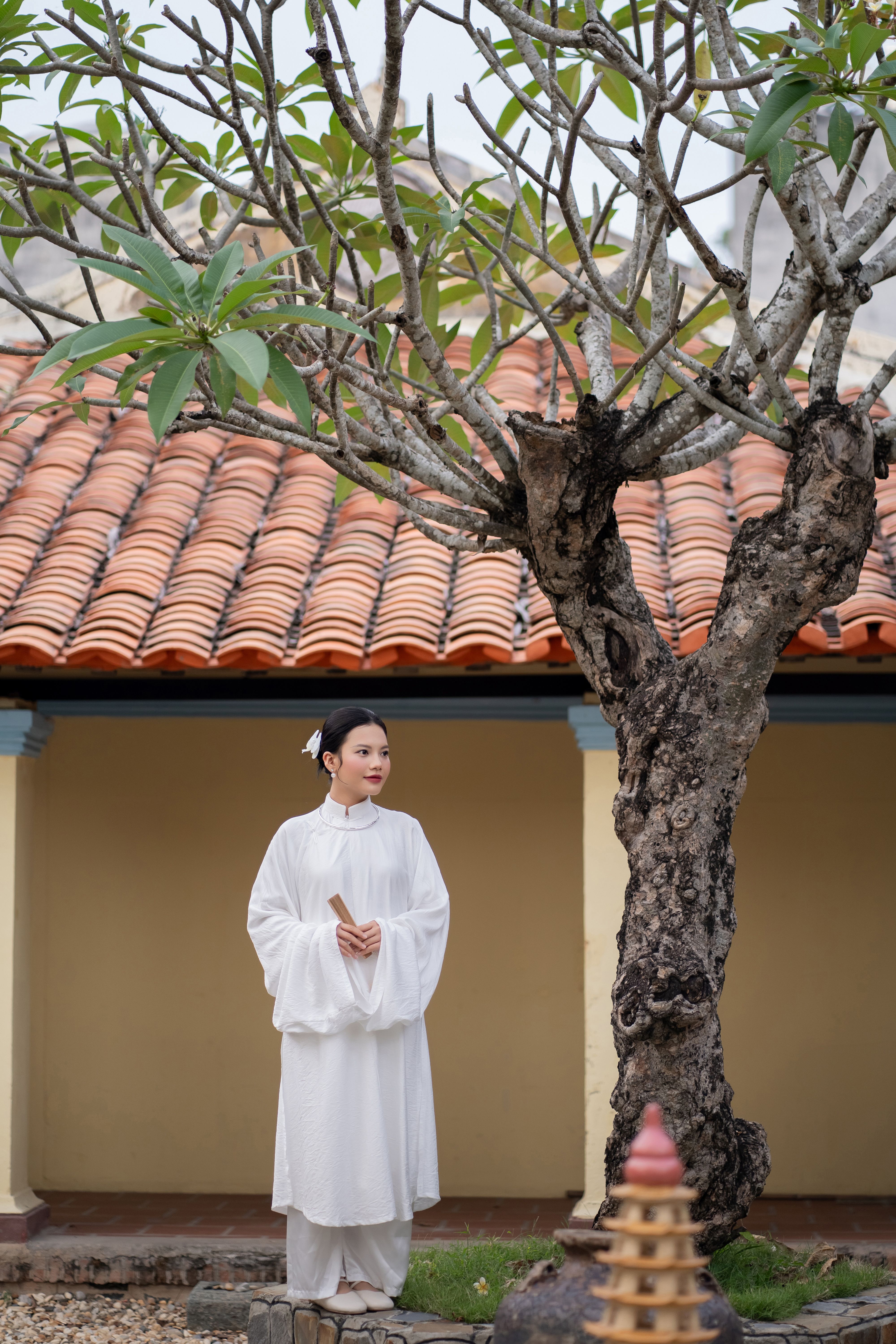 Woman in Traditional White Gown by Tree · Free Stock Photo