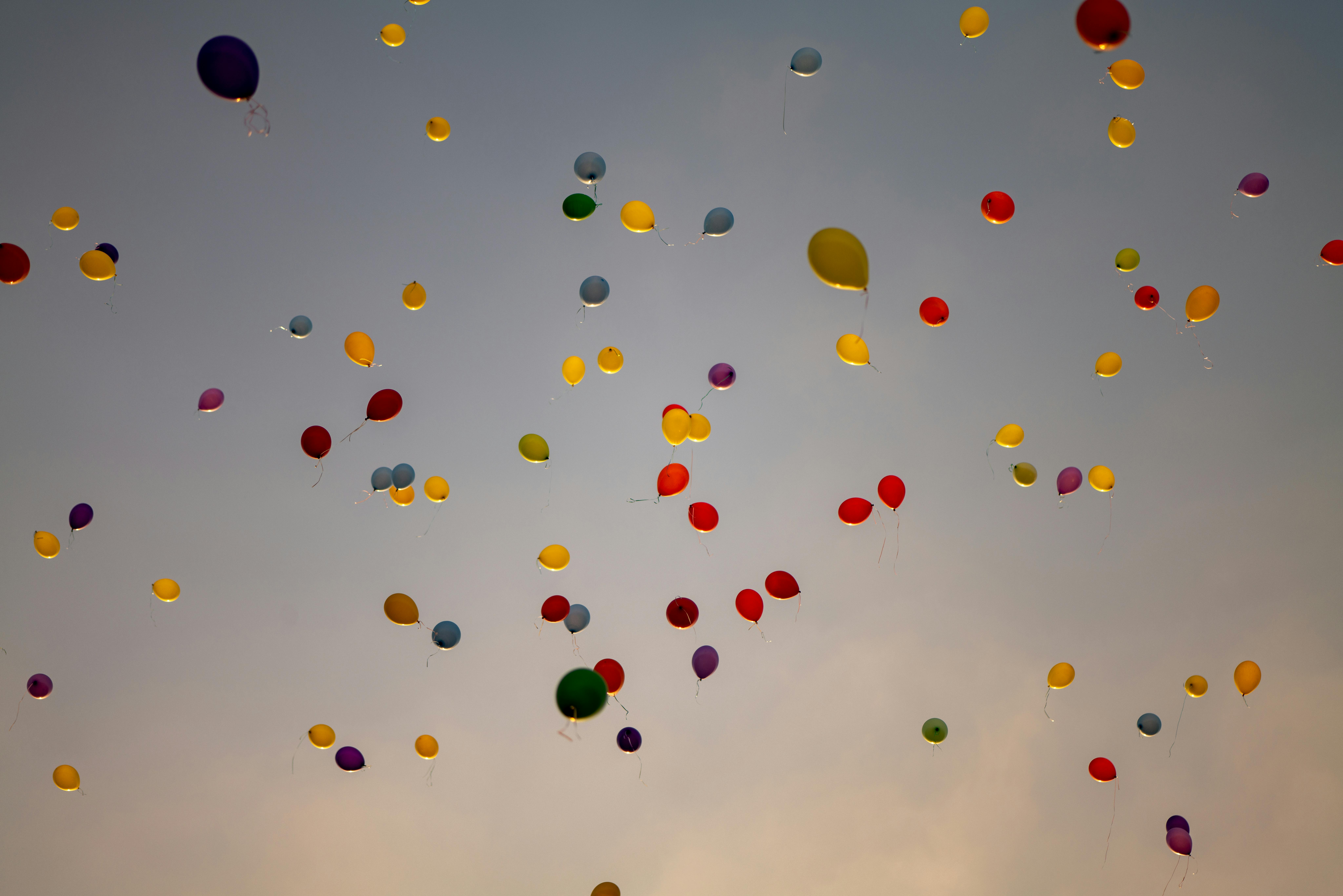Colorful Smile Balloons Floating in Clear Sky · Free Stock Photo