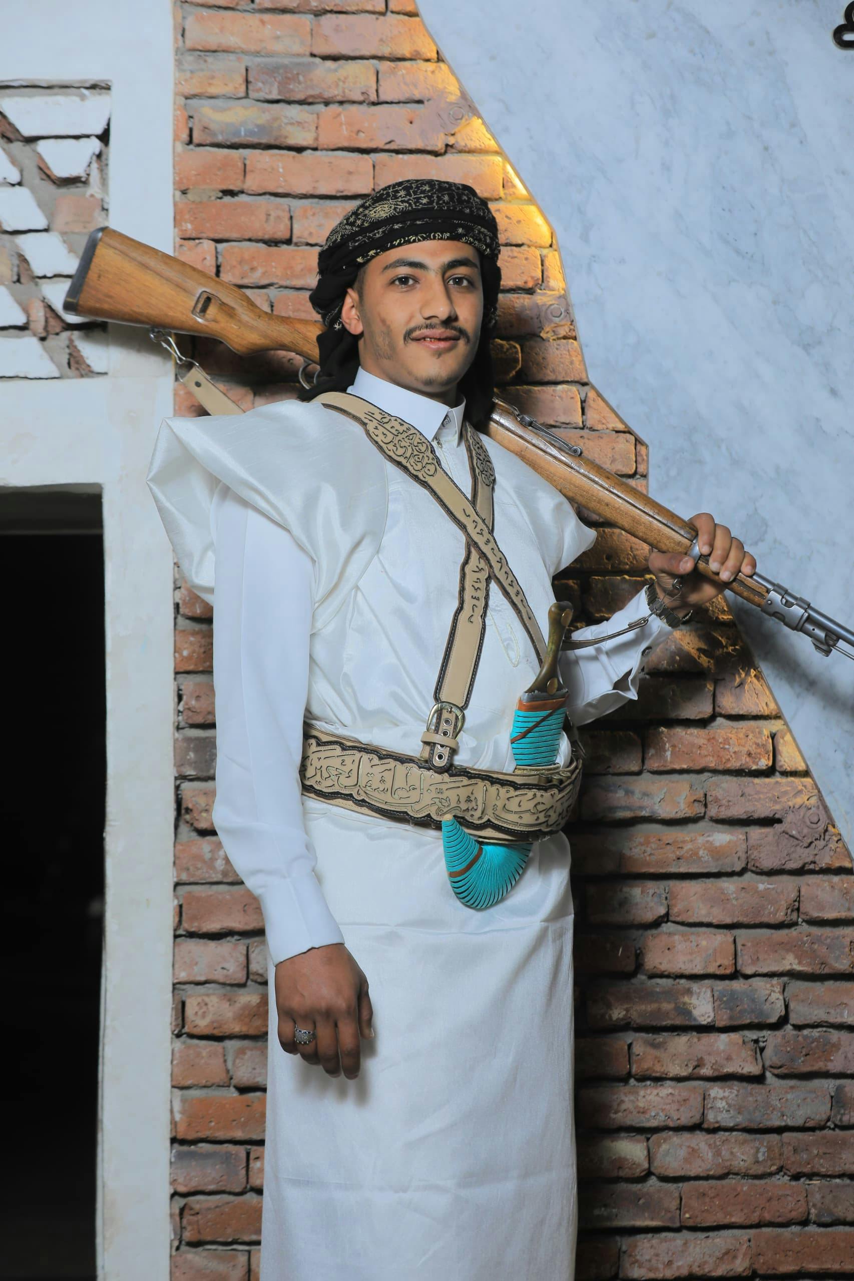 Men in White Clothes and Purple Turbans with Rifles and Daggers · Free ...