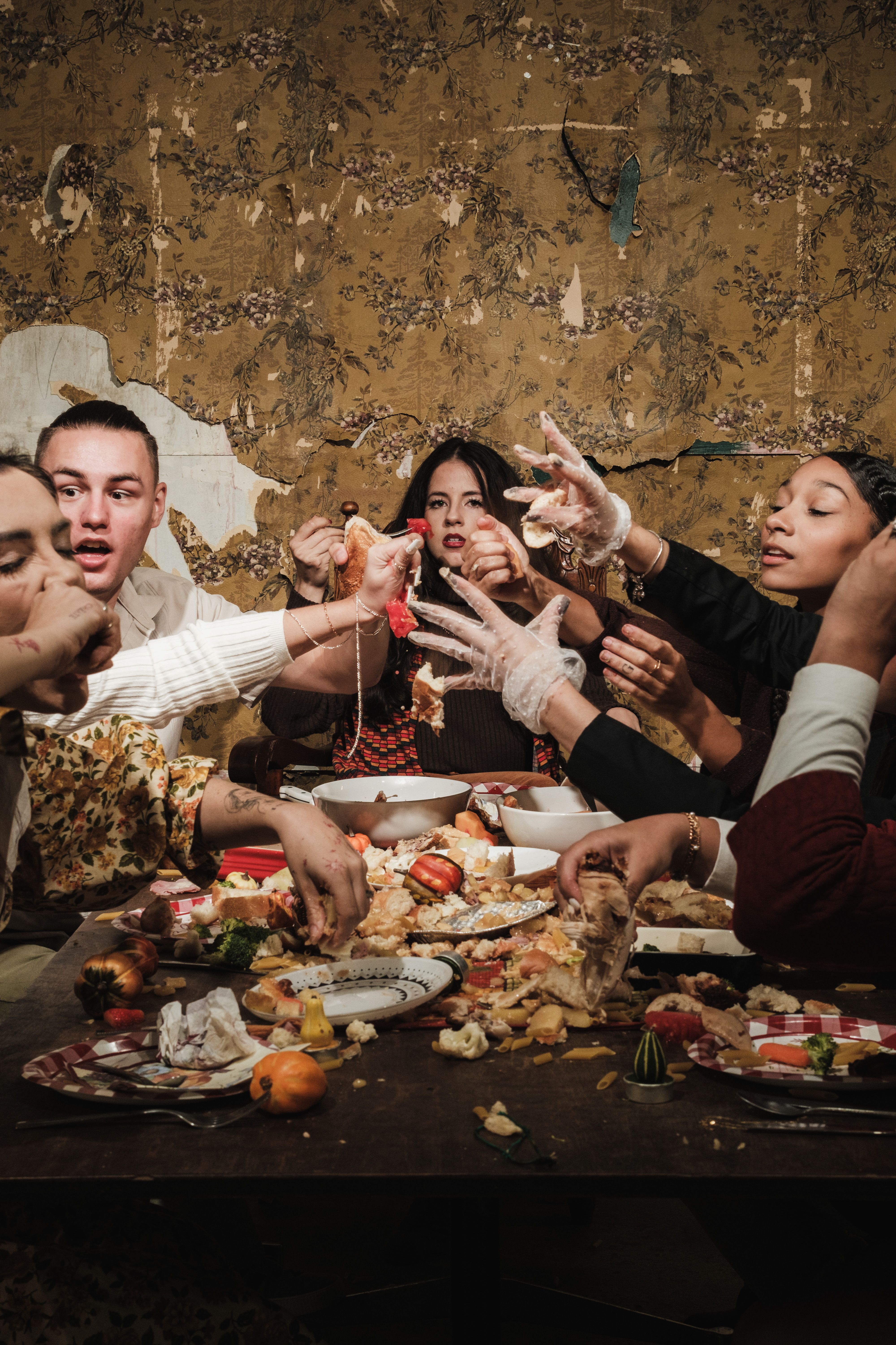 Chaotic Festive Dinner with Friends Gathering · Free Stock Photo