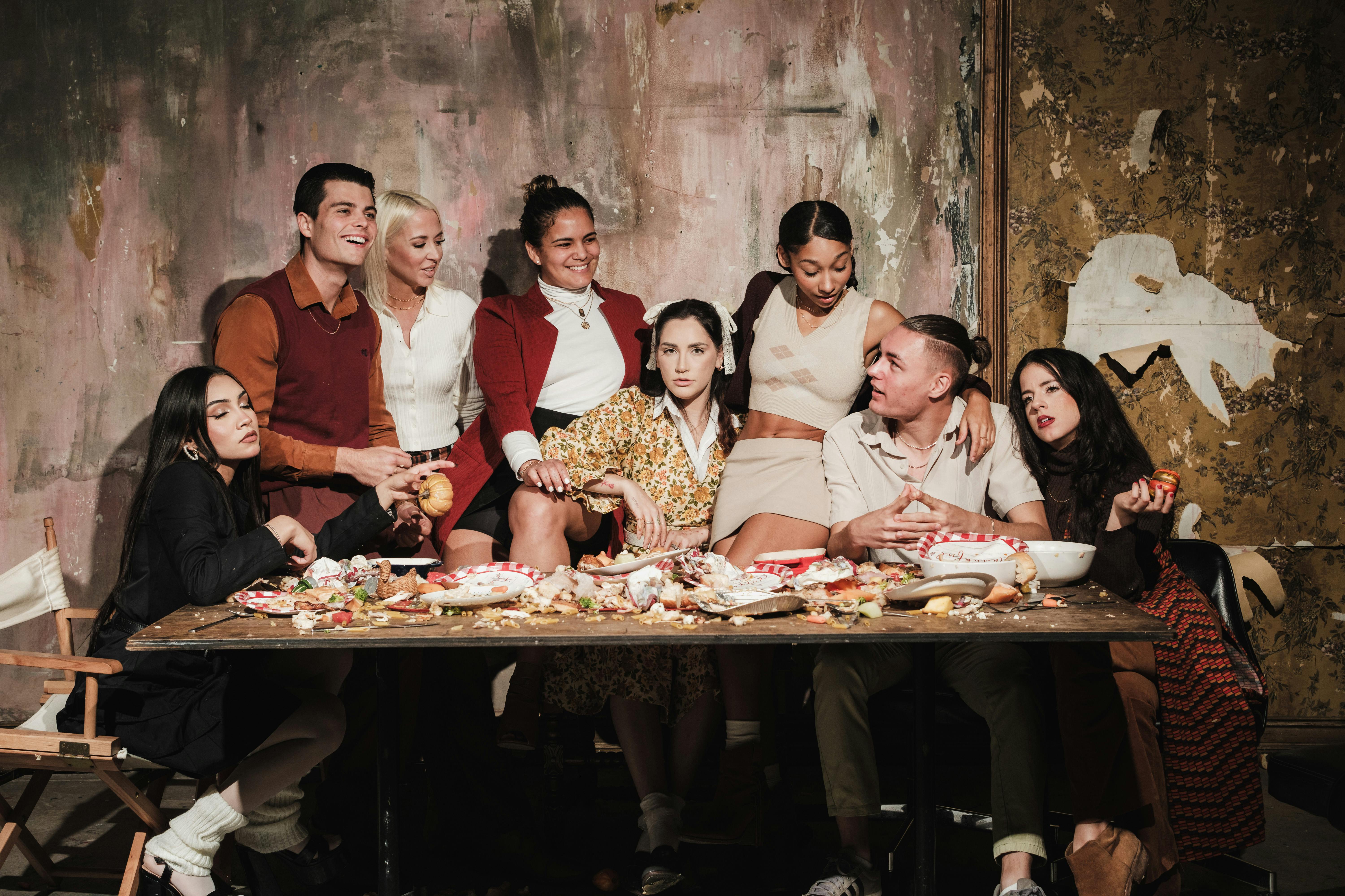 Vibrant Group Gathering with Festive Feast · Free Stock Photo