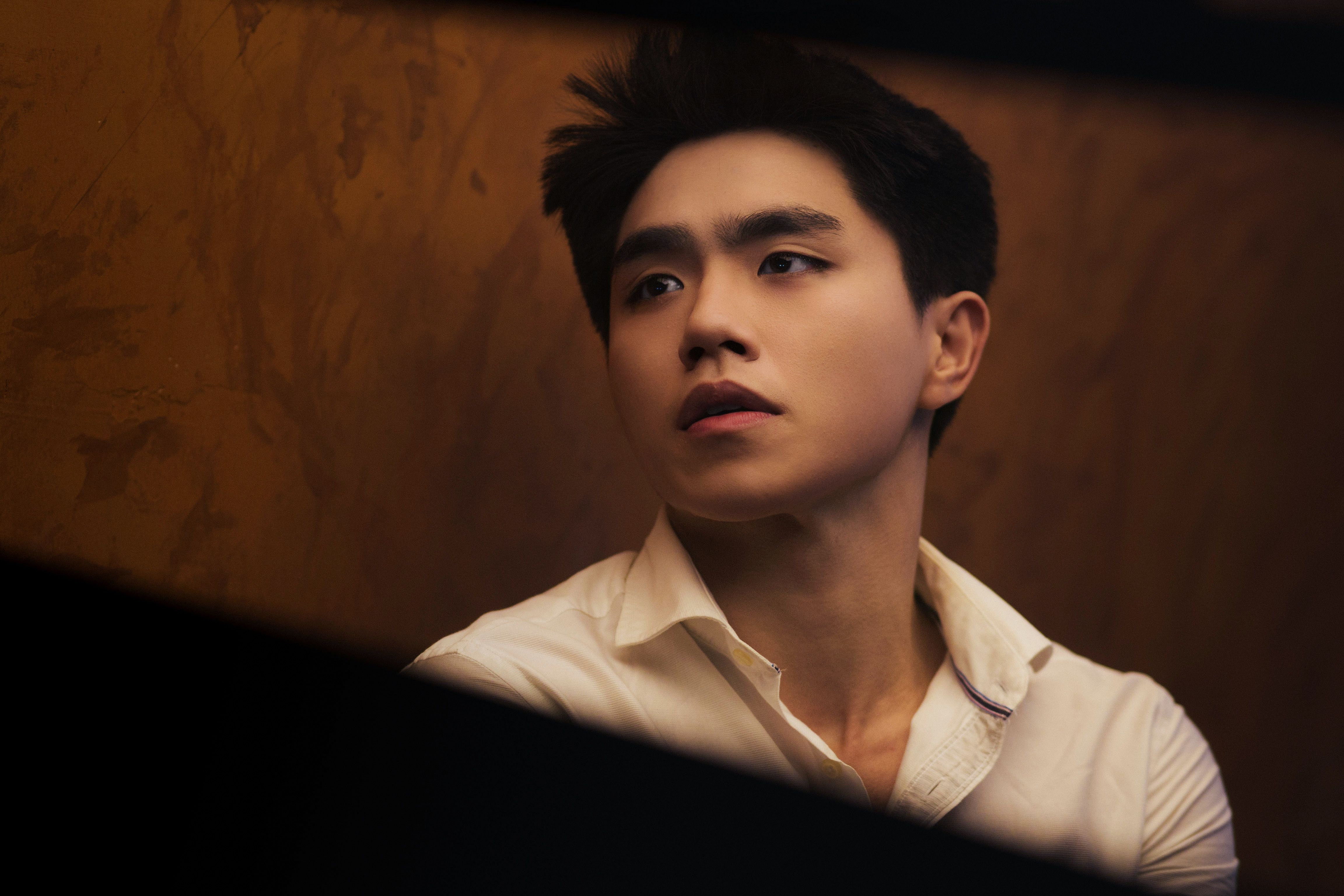 Dramatic Portrait of a Young Man Indoors · Free Stock Photo