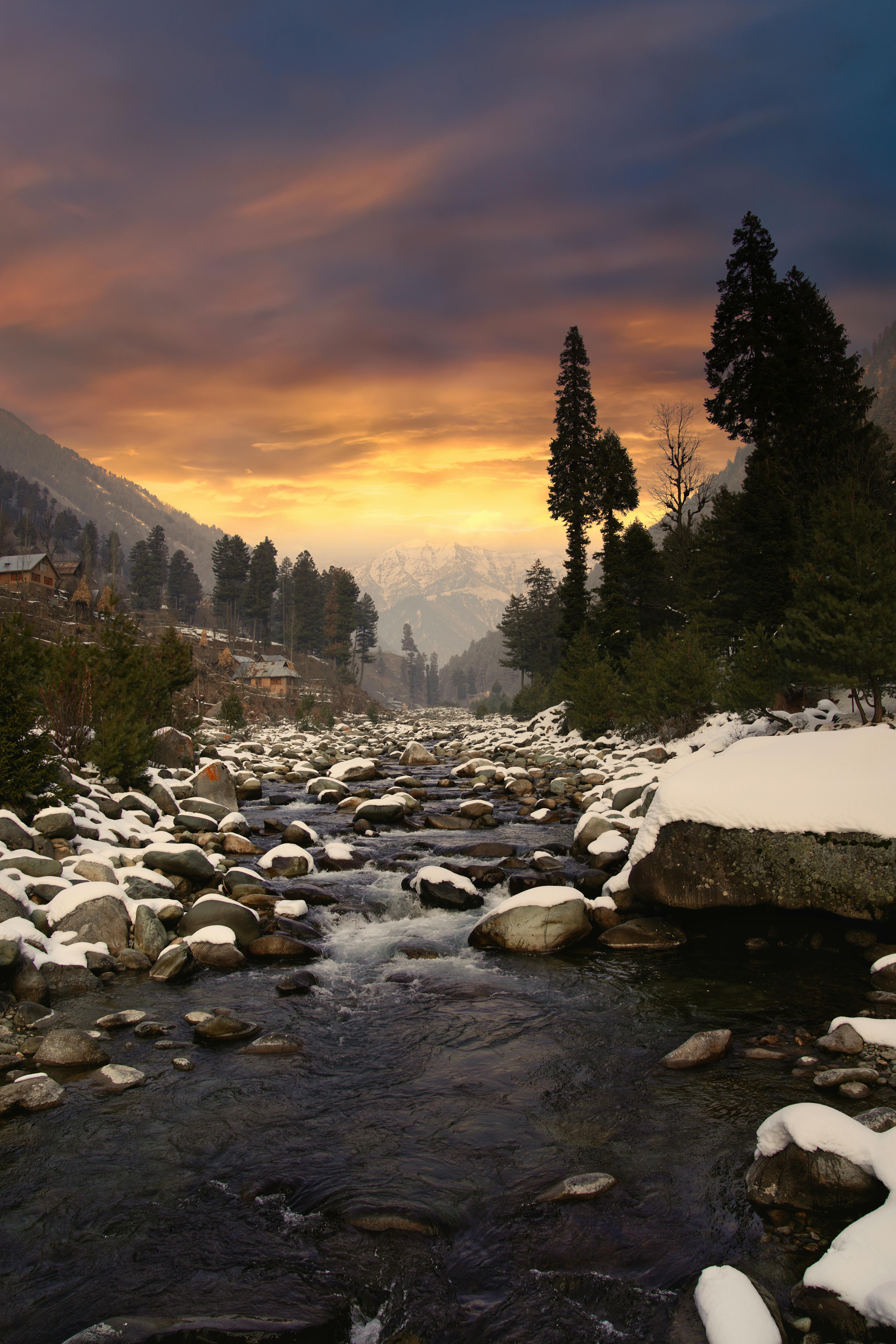 Sunset over Snow-Capped River in Kashmir Valley · Free Stock Photo