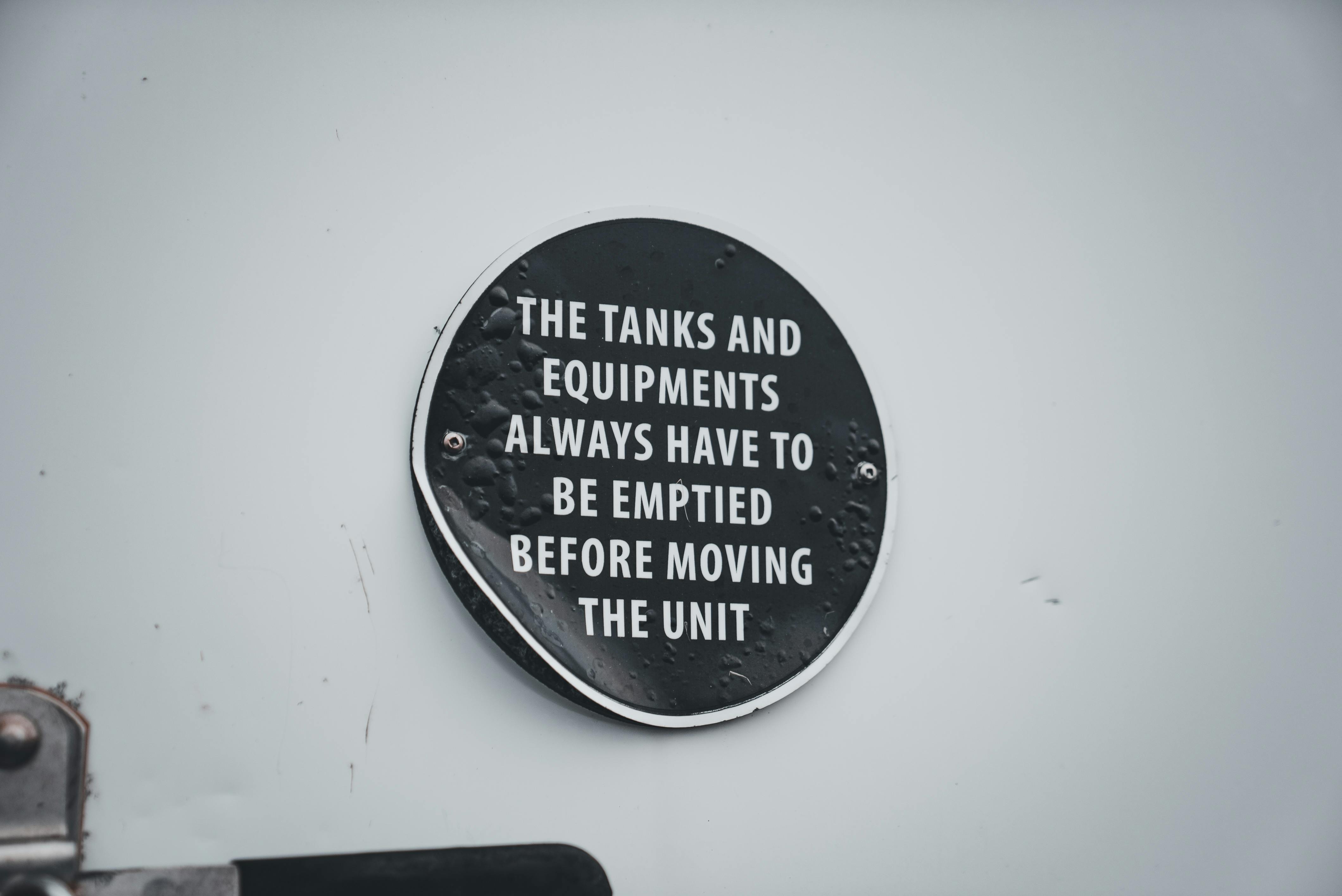 Warning Sign on Industrial Equipment · Free Stock Photo