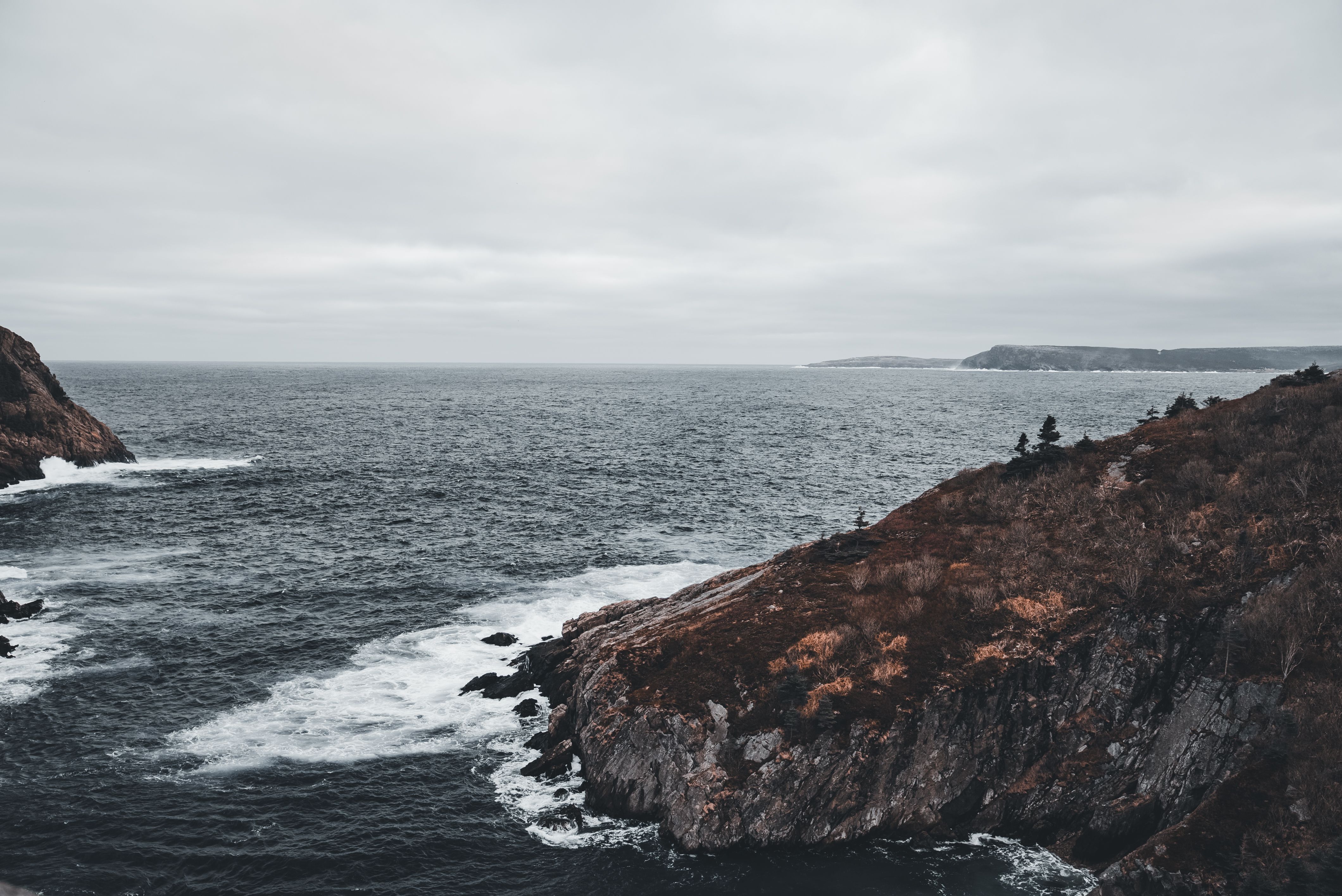 Dramatic Coastline Landscape with Cliffs and Ocean Waves · Free Stock Photo