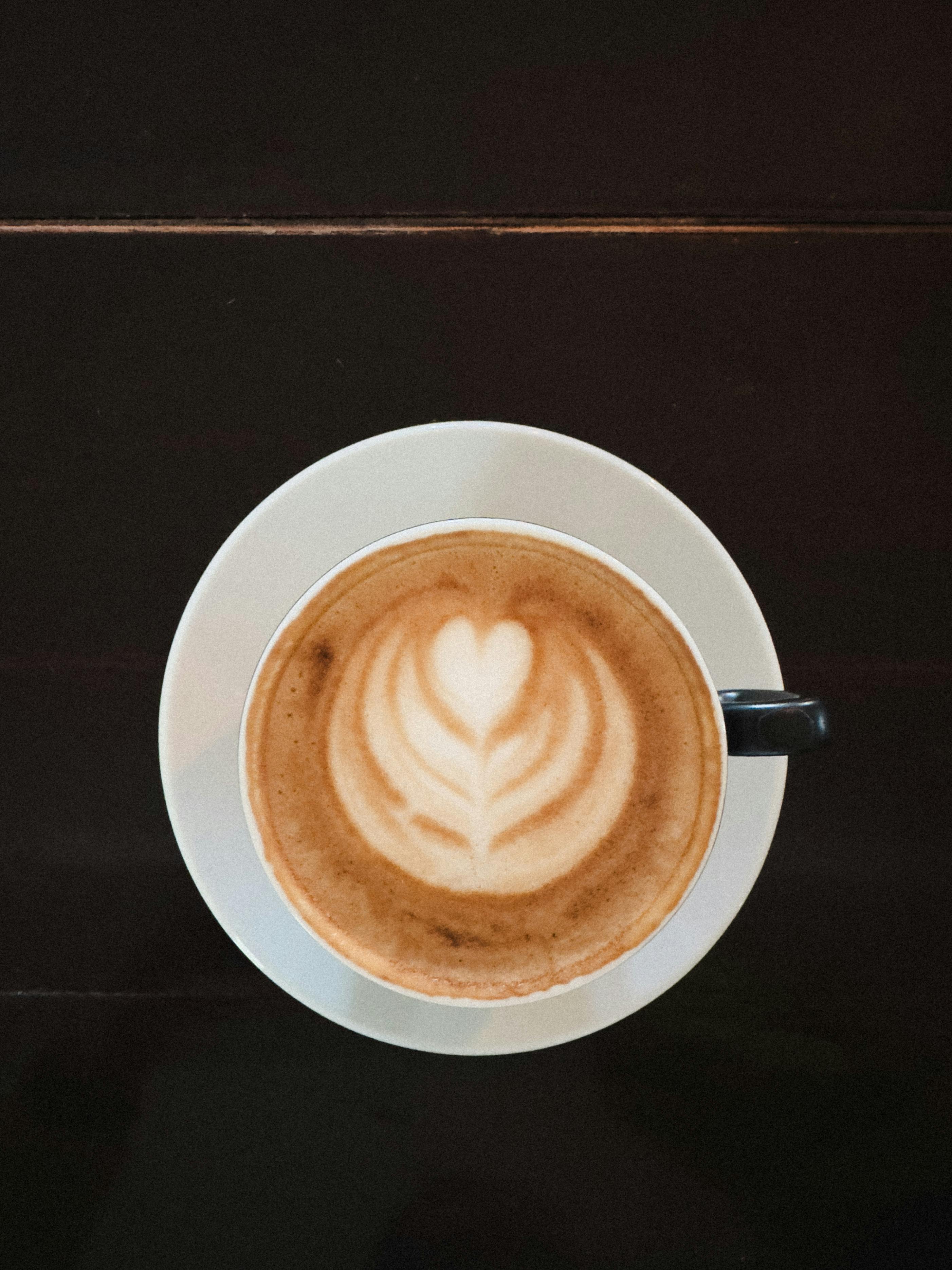 Artistic Coffee Latte with Heart Design · Free Stock Photo