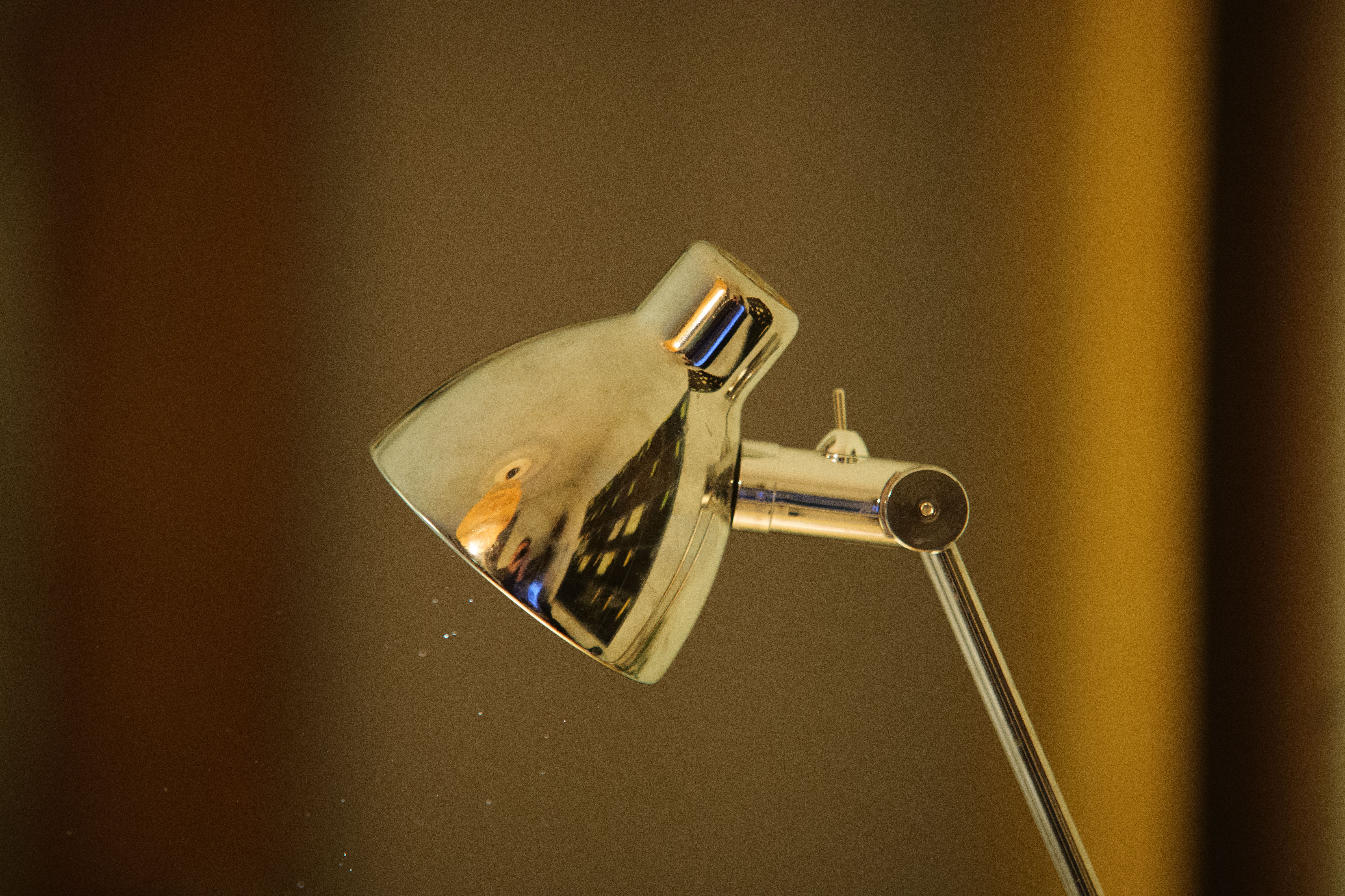 Stylish Metallic Desk Lamp with Reflection · Free Stock Photo
