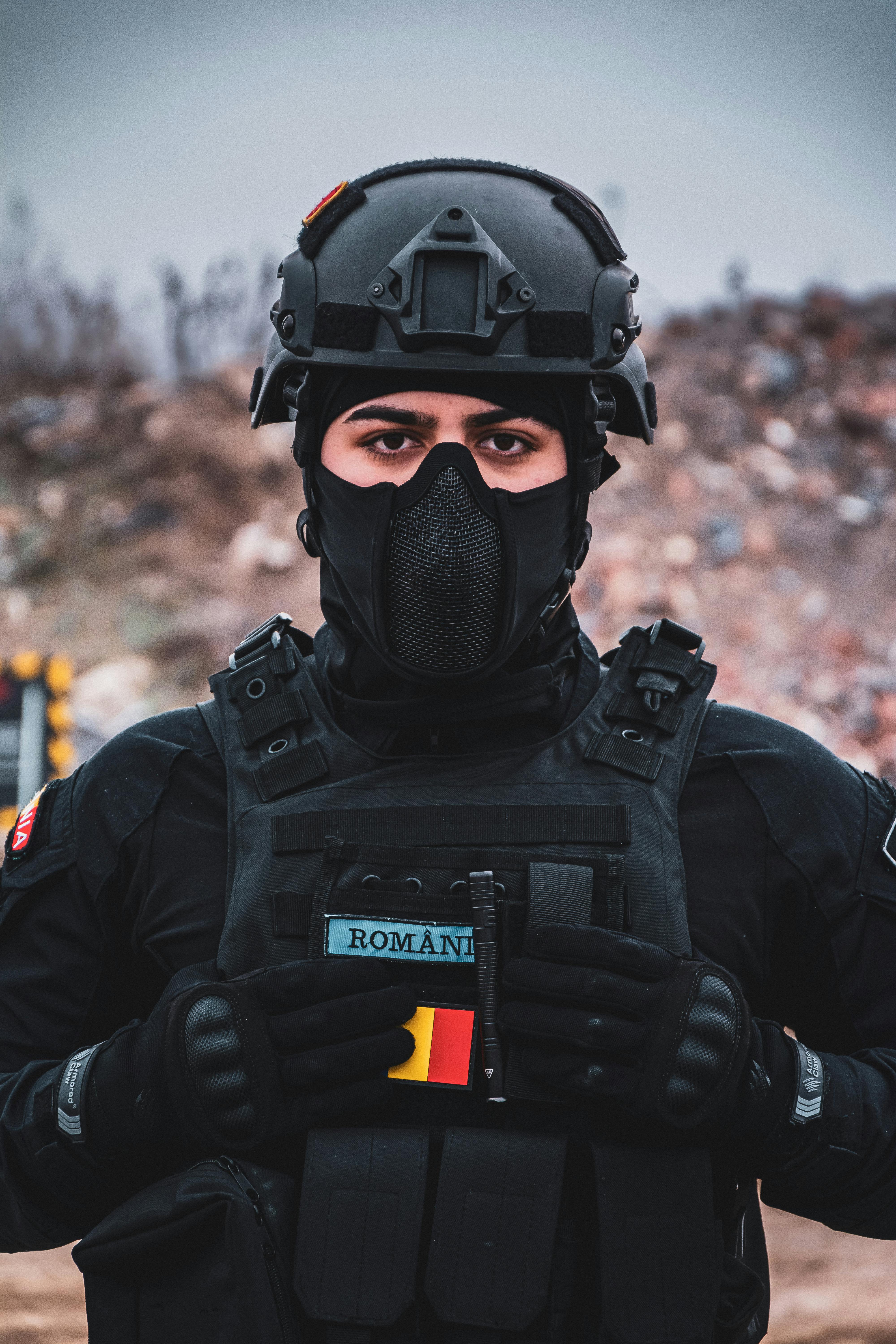 Romanian Special Forces Soldier Standing Outdoors · Free Stock Photo