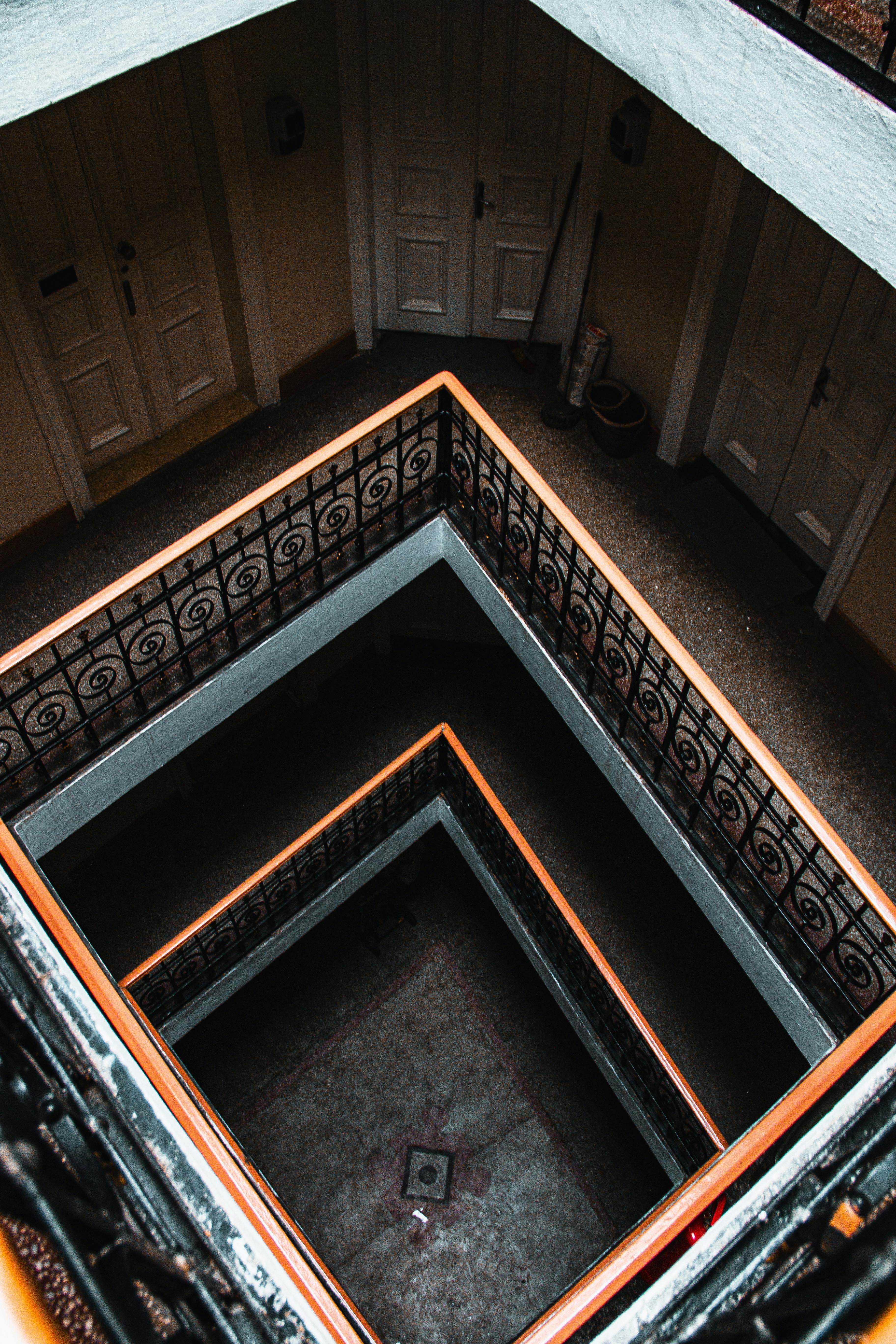 Geometric View of Multi-level Staircase Inside Building · Free Stock Photo