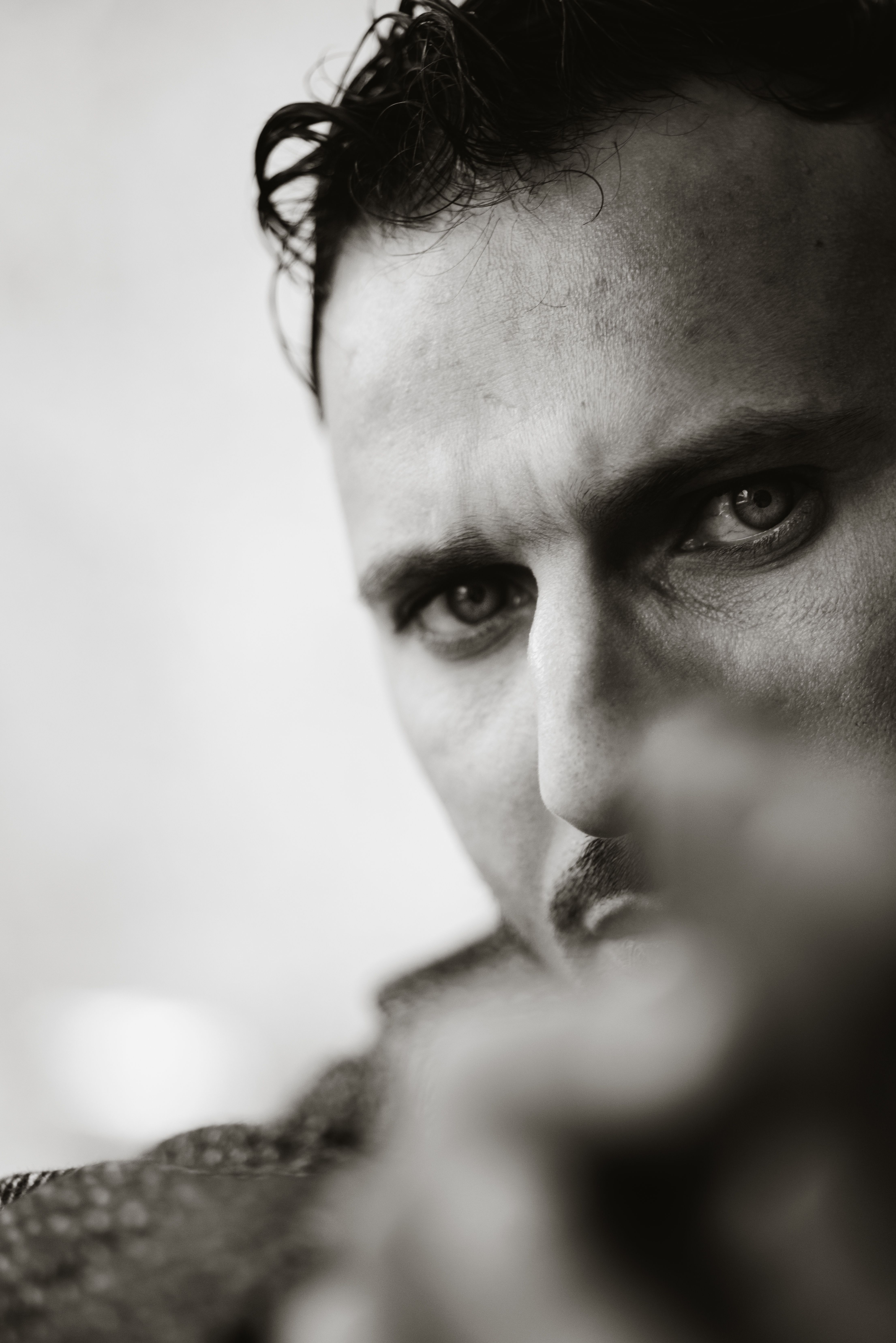 Dramatic Close-up Portrait of Intense Man · Free Stock Photo