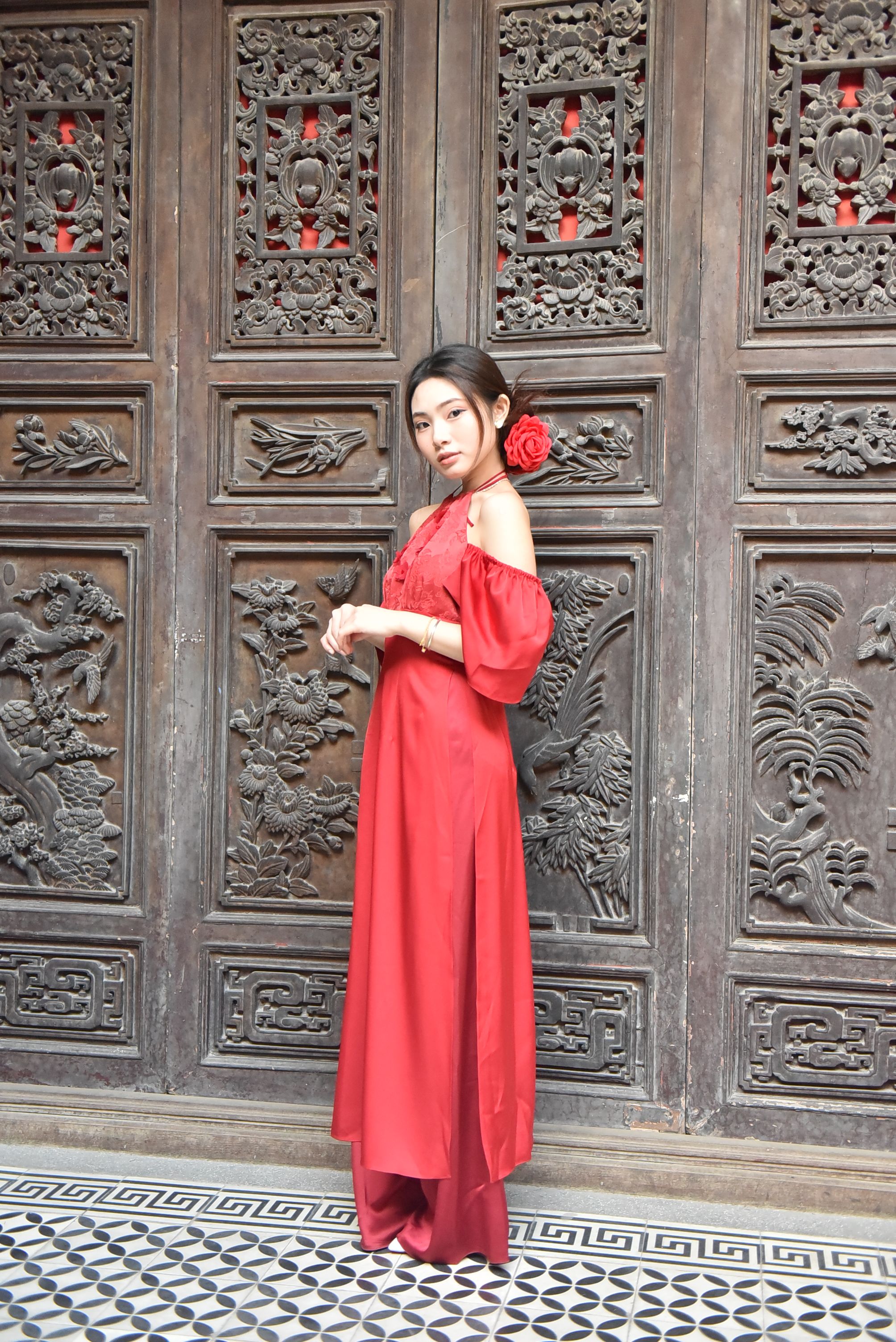 Elegantly Dressed Woman in Traditional Red Attire · Free Stock Photo