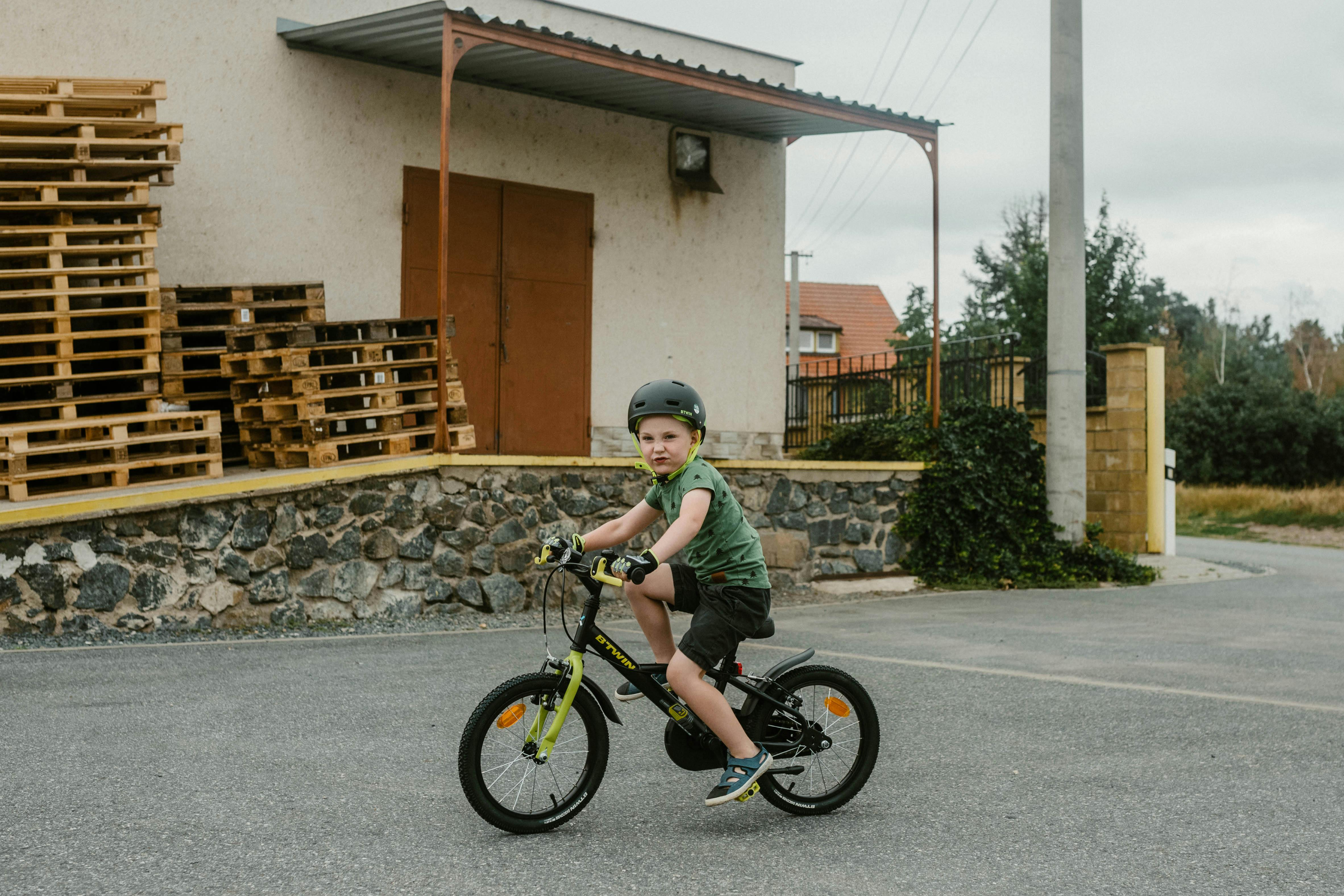Boy Riding Bike at Daytime · Free Stock Photo