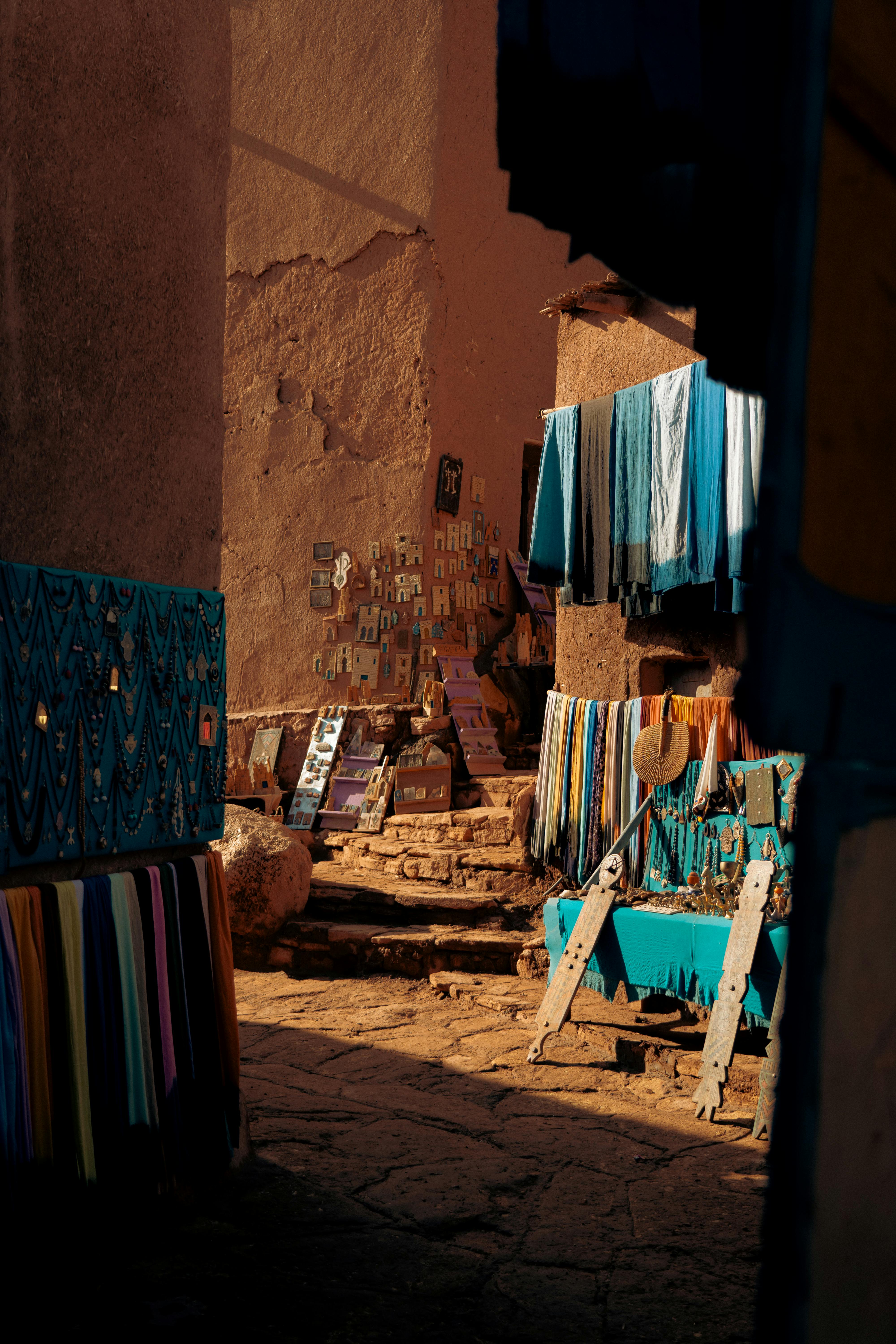 Charming Alleyway Market with Textiles · Free Stock Photo