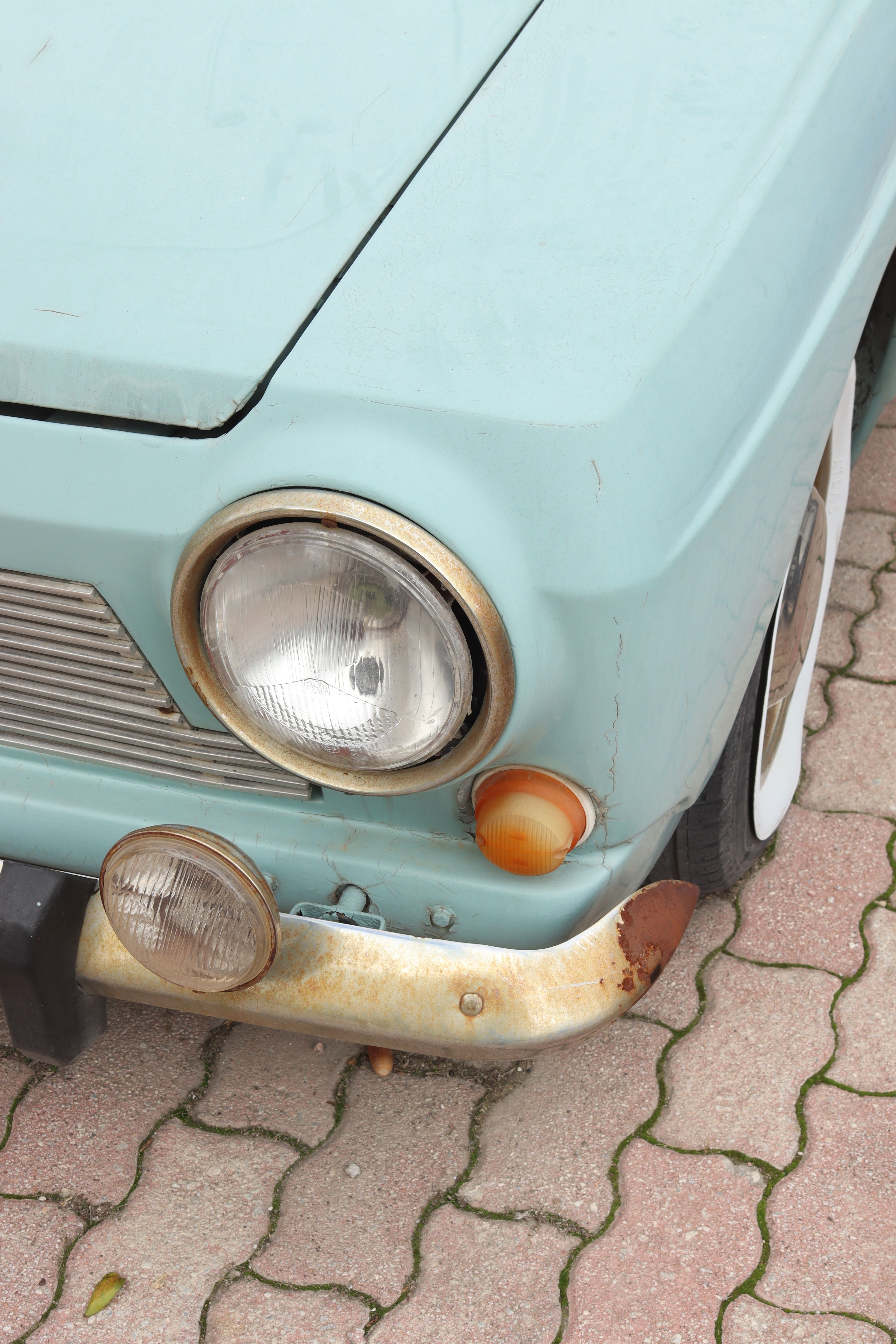 Close-up of Vintage Blue Car Bumper and Headlight · Free Stock Photo
