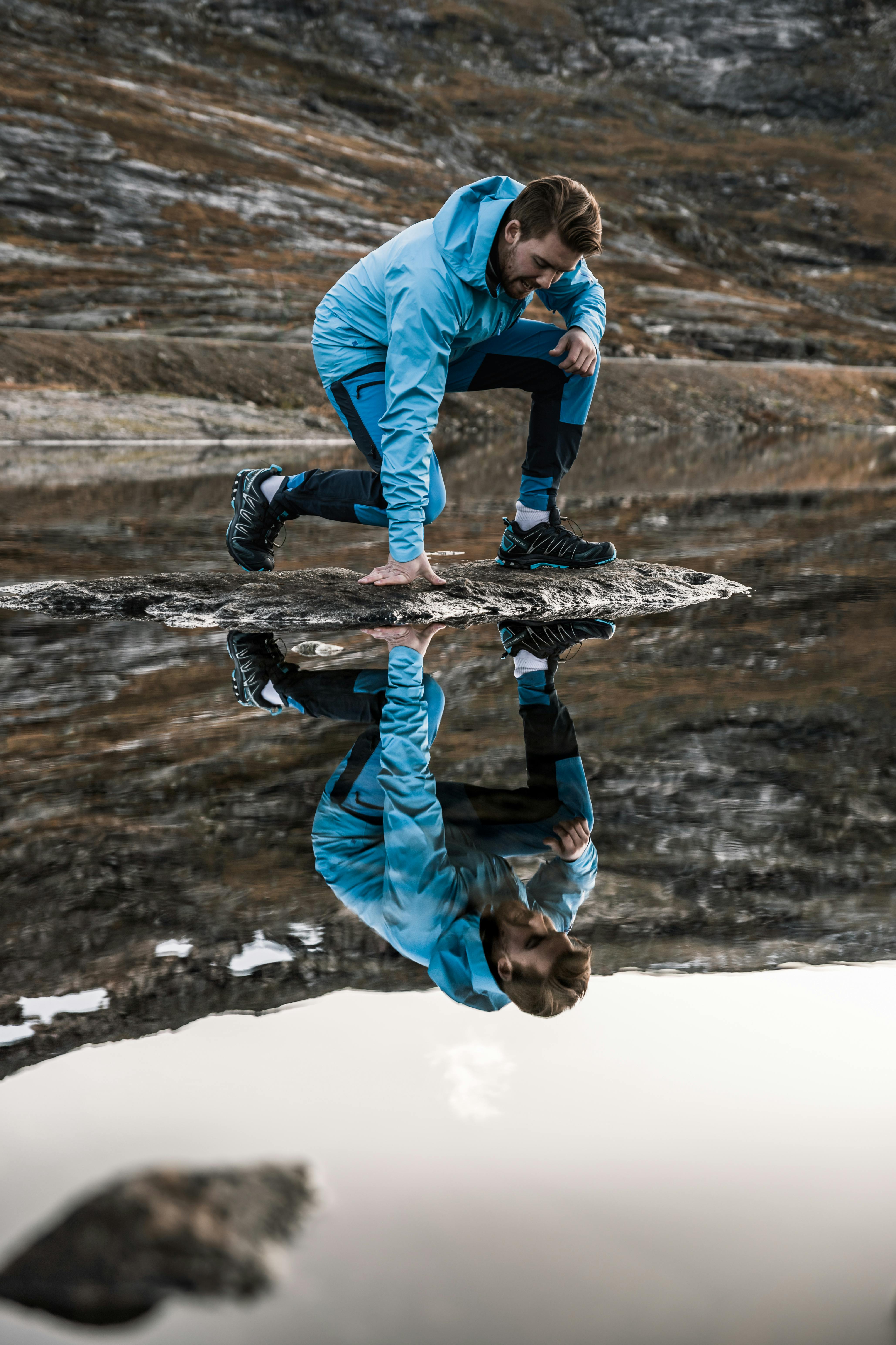 Photo Of A Man Kneeling · Free Stock Photo