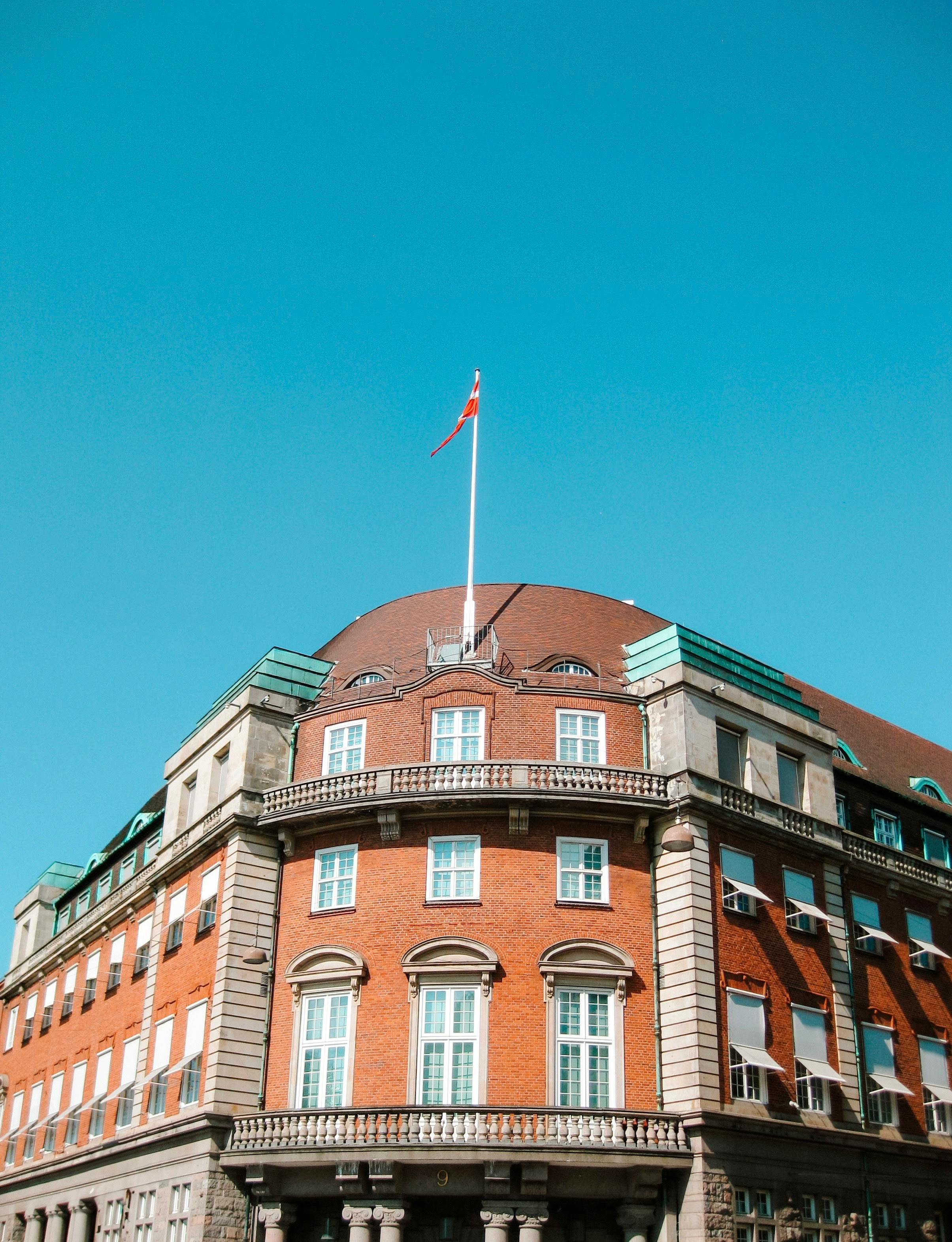 Historic Danish Building Under Blue Sky · Free Stock Photo
